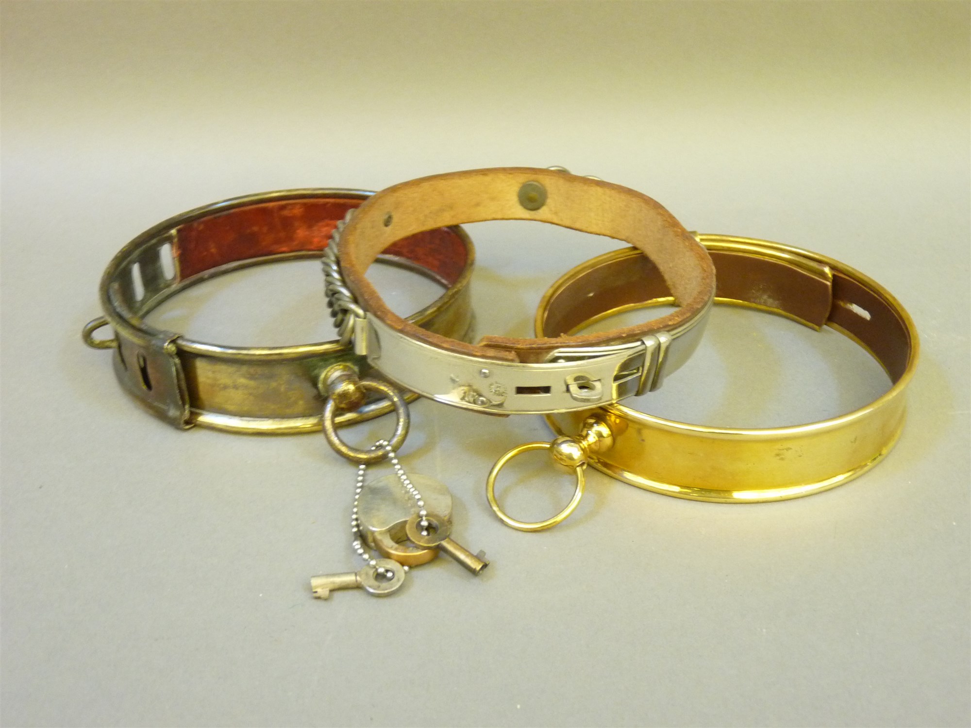Lot 261 - Three dog collars