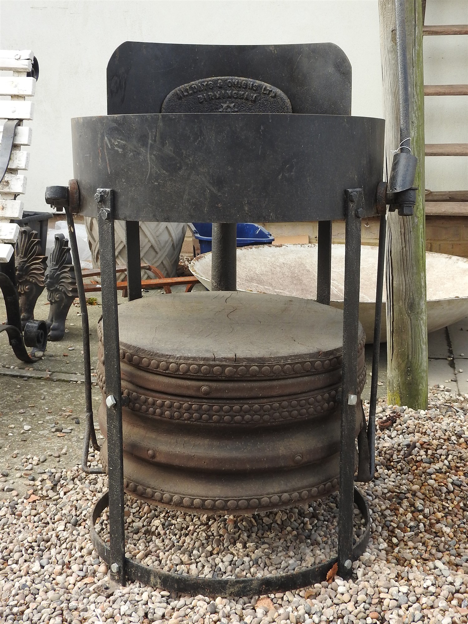 Lot 720 - A blacksmith's furnace with foot bellows