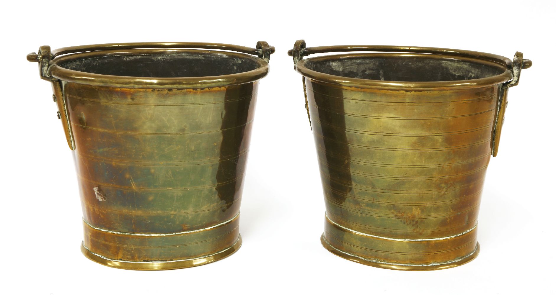 Lot 502 - A pair of brass pail measures