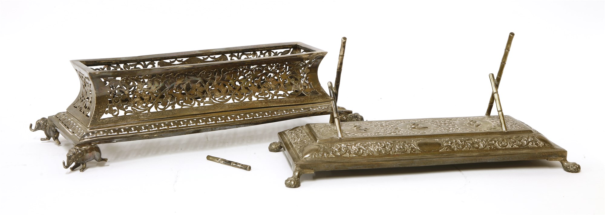 Lot 253 - Two Indian silver scroll holder bases