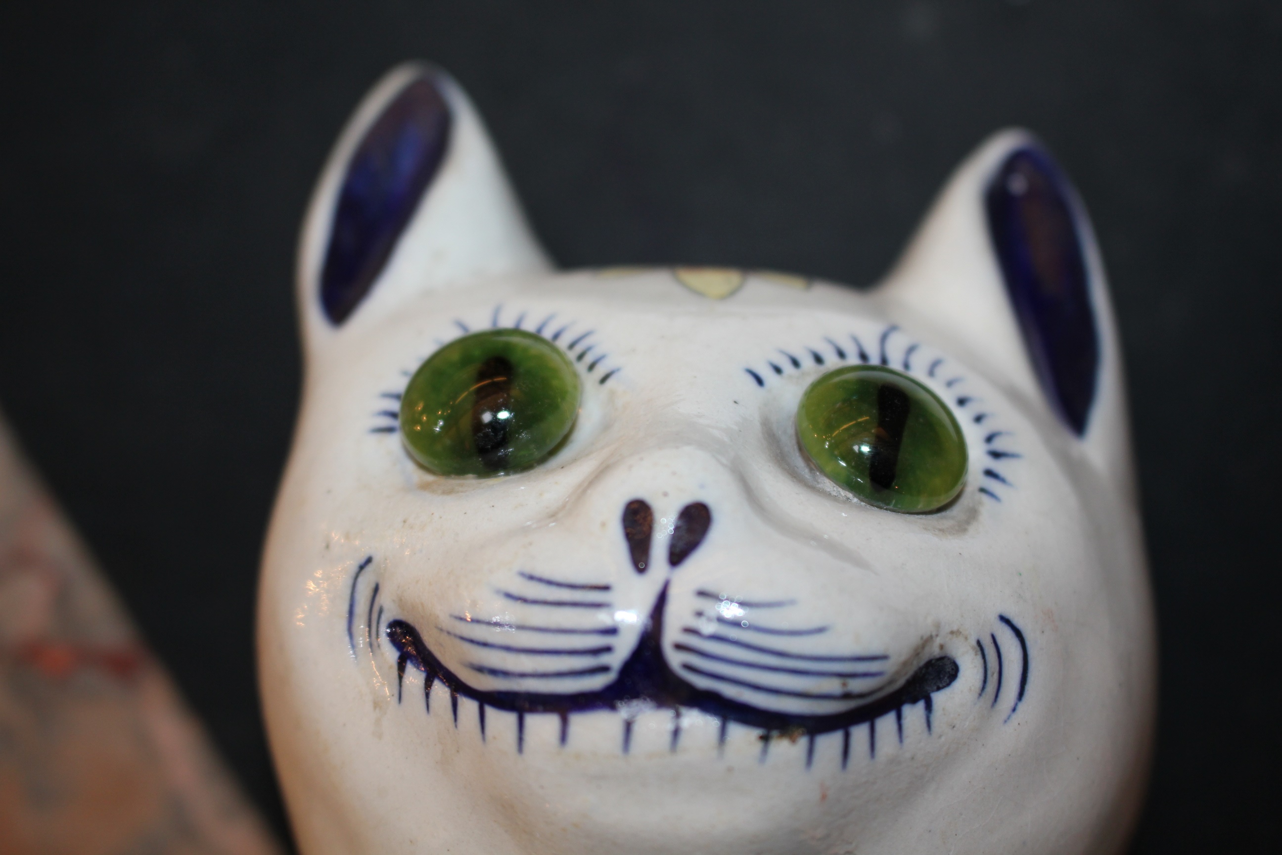 Lot 10 - A French faience pottery cat,