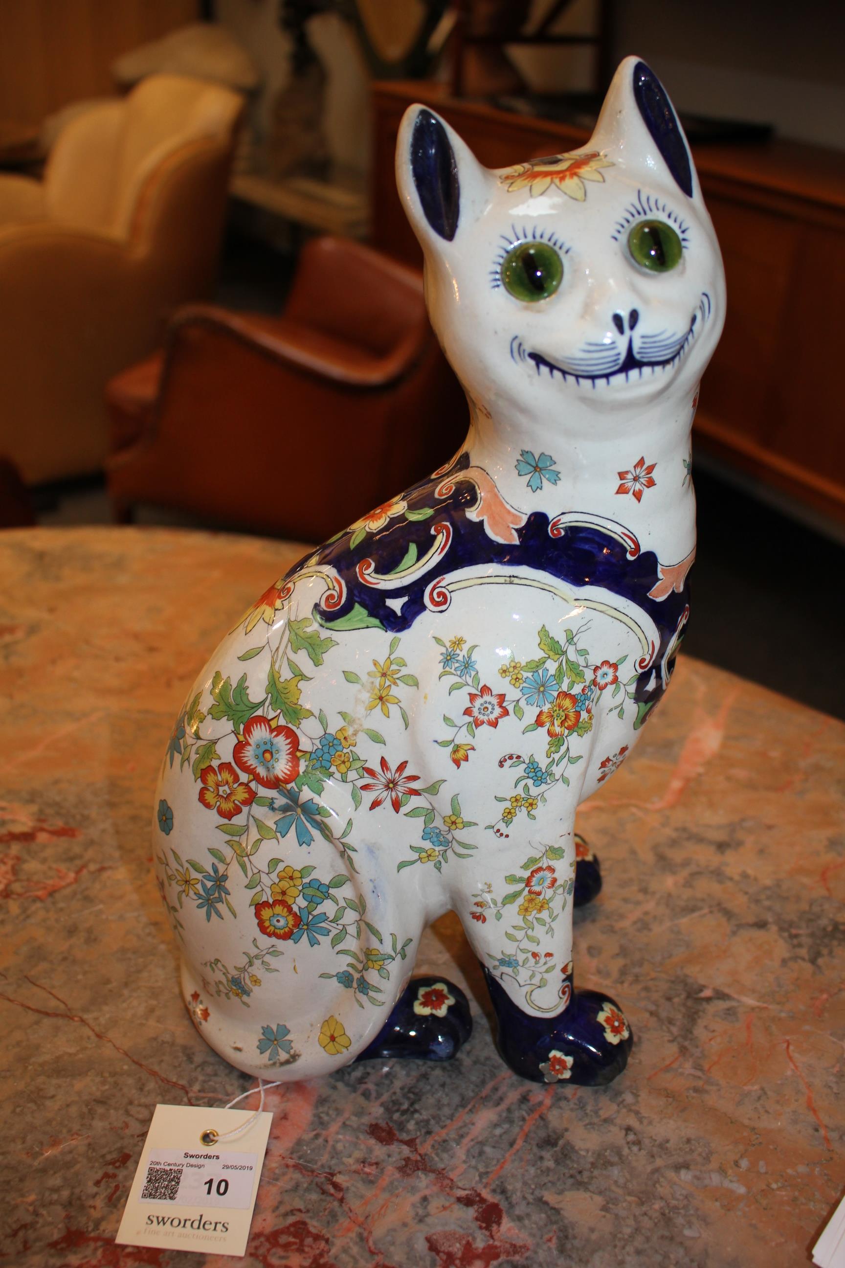 Lot 10 - A French faience pottery cat,