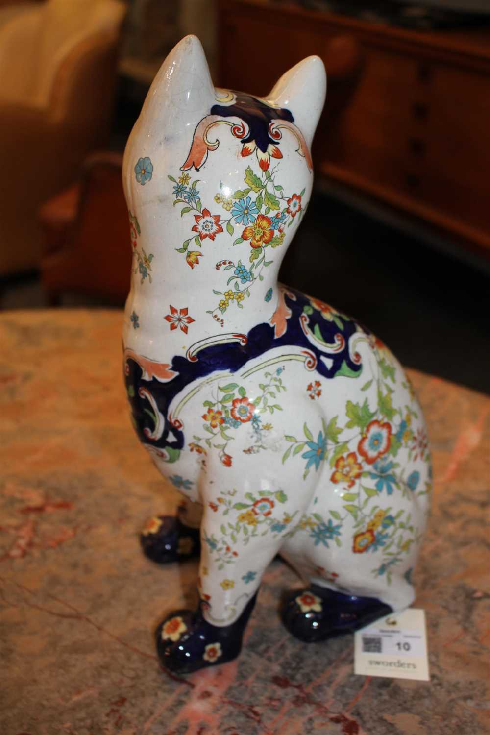 Lot 10 - A French faience pottery cat,