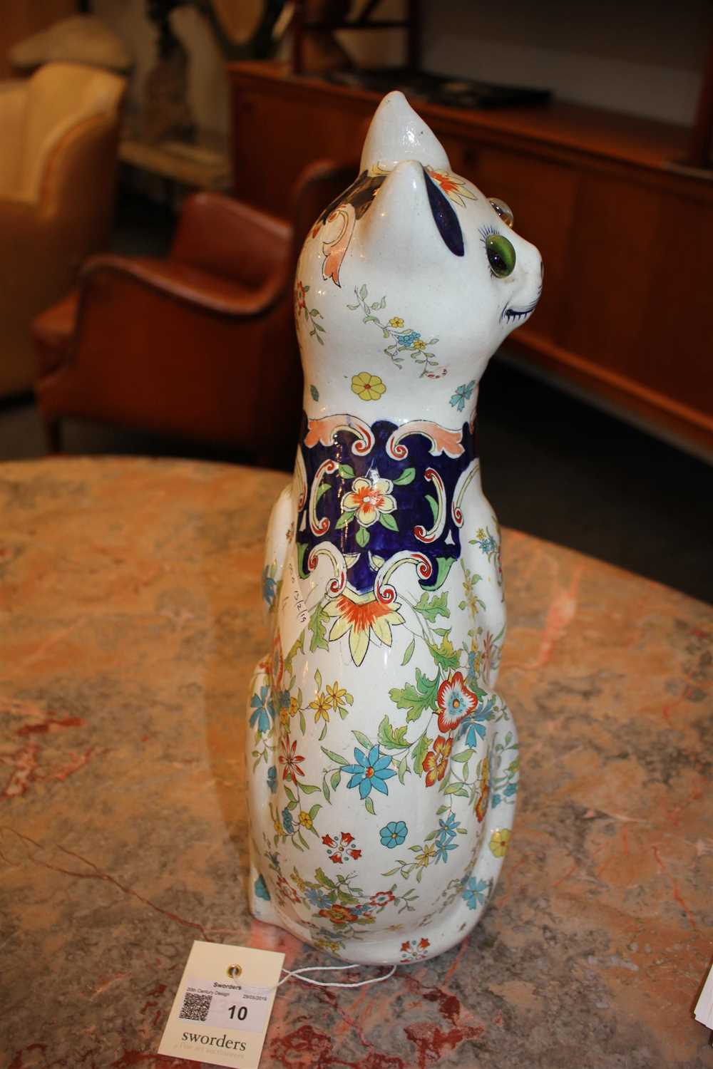 Lot 10 - A French faience pottery cat,