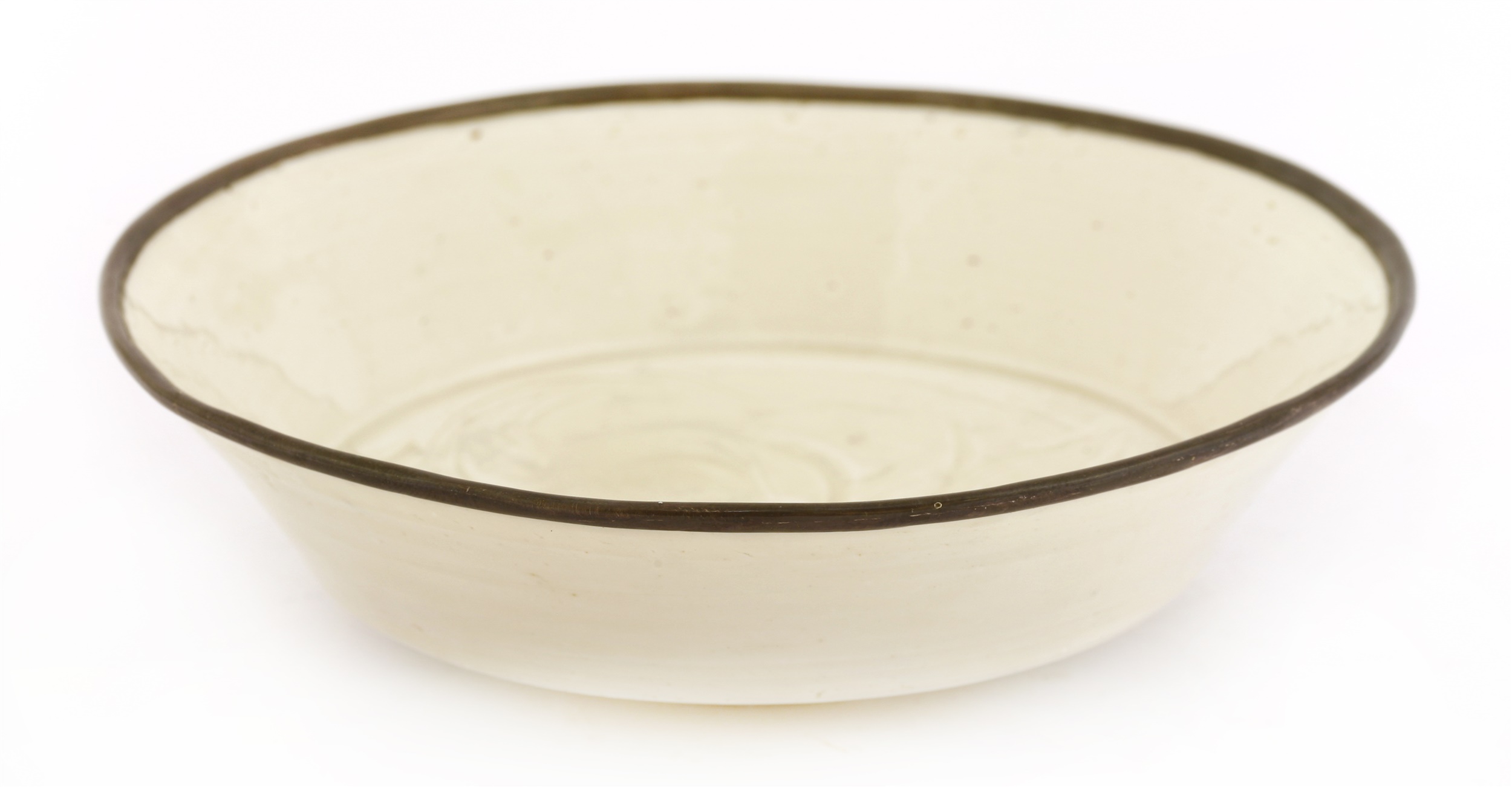 Lot 26 - A Chinese Ding ware bowl