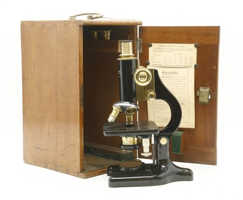 Lot 428 - A cased Charles Perry microscope,