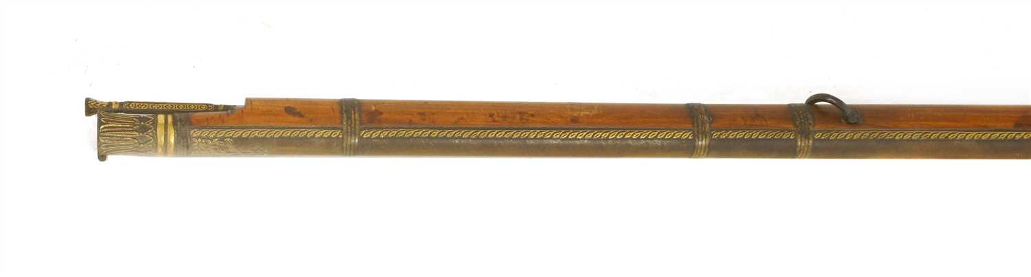 Lot 557 - An Indian 'torador' matchlock musket,