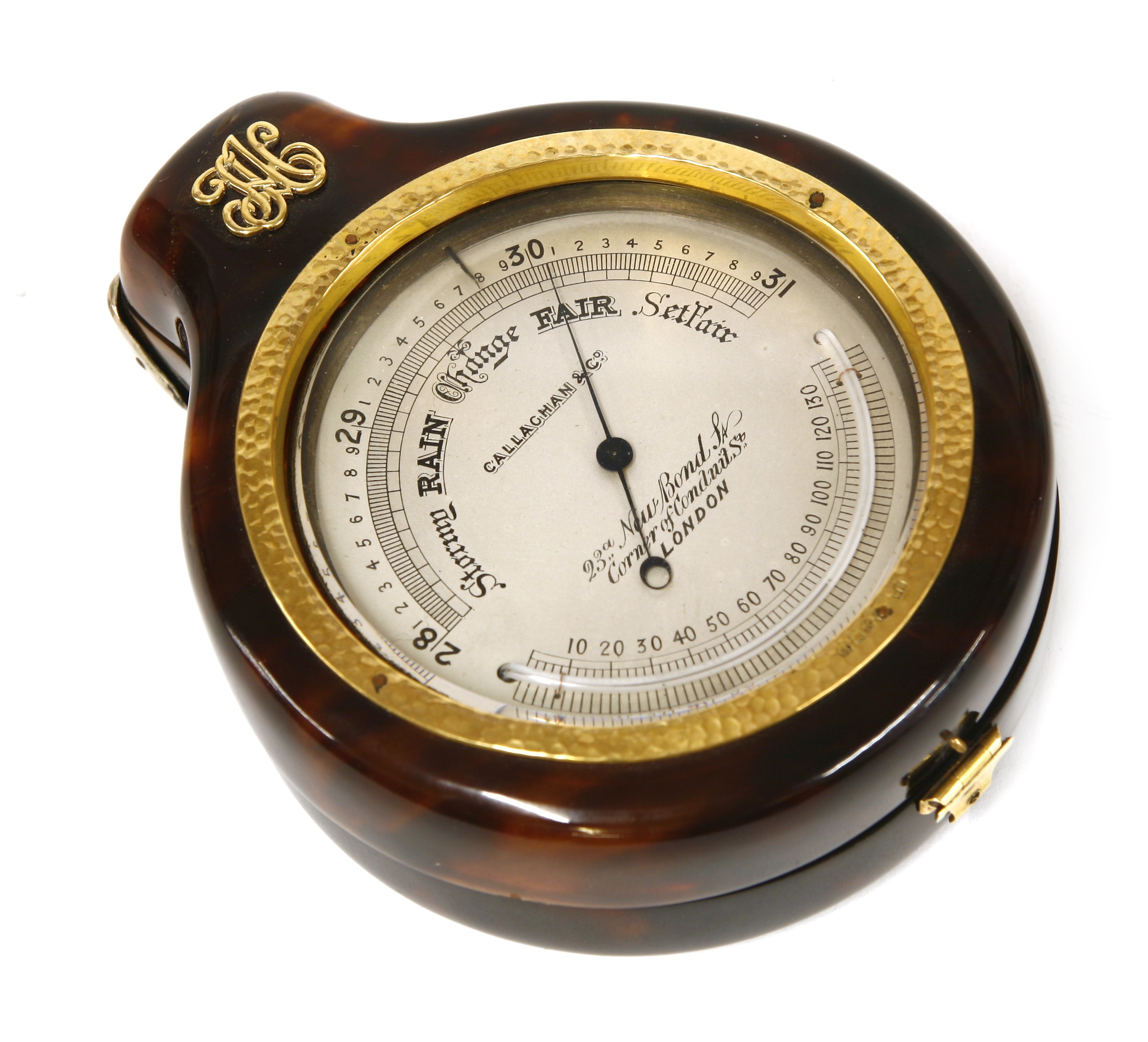 Lot 194 - A brass cased desk barometer,