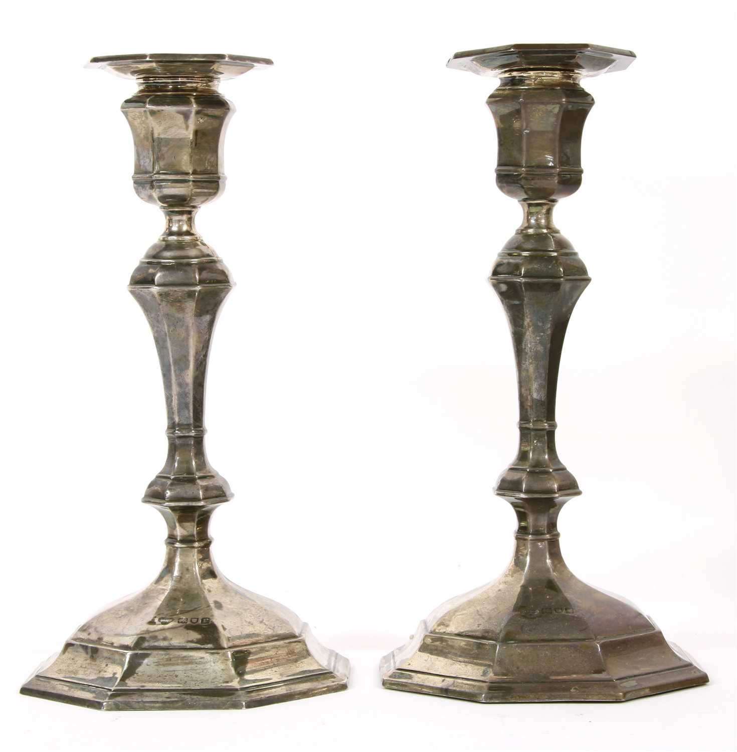 Lot 156 - A pair of George V silver candlesticks, by