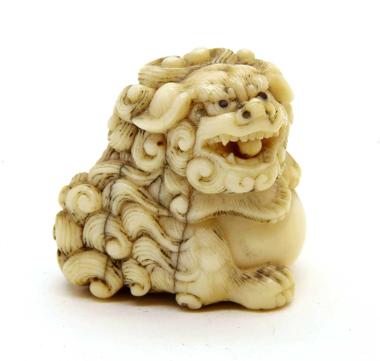 Lot 124 - A Japanese ivory netsuke,