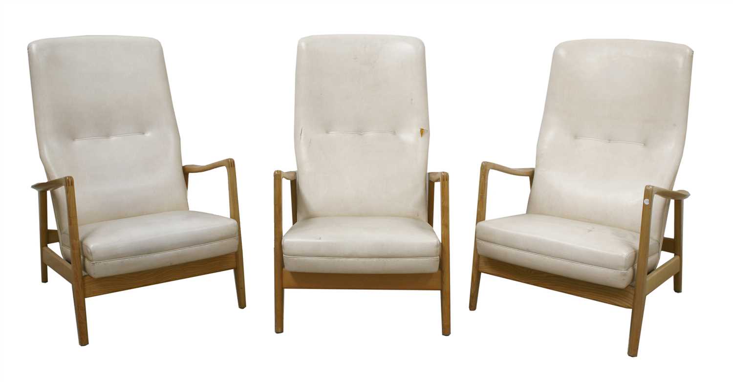Lot 628 - Three ash lounge chairs,