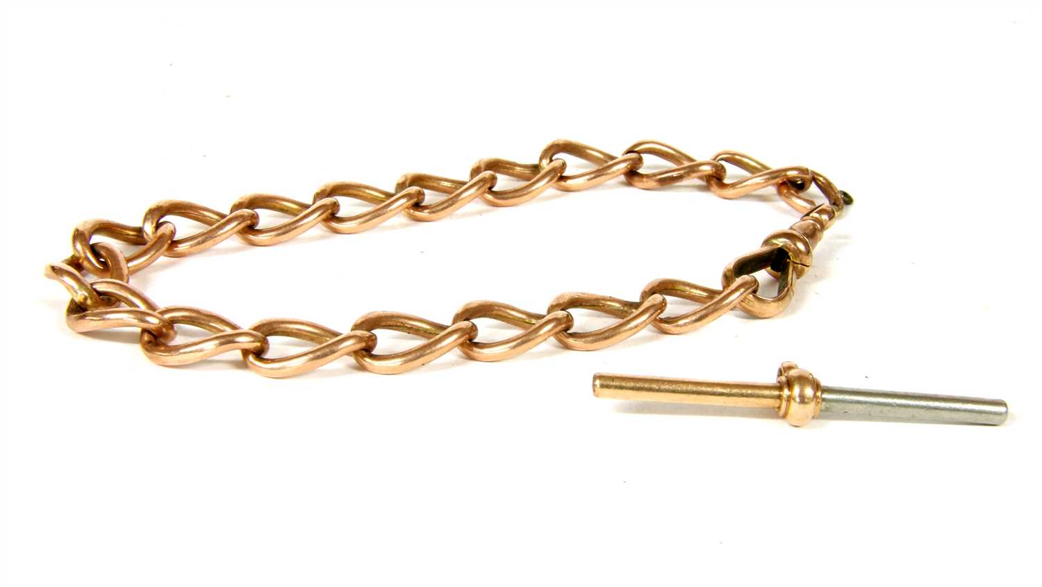 Lot 120 - A two colour T-bar fitting,