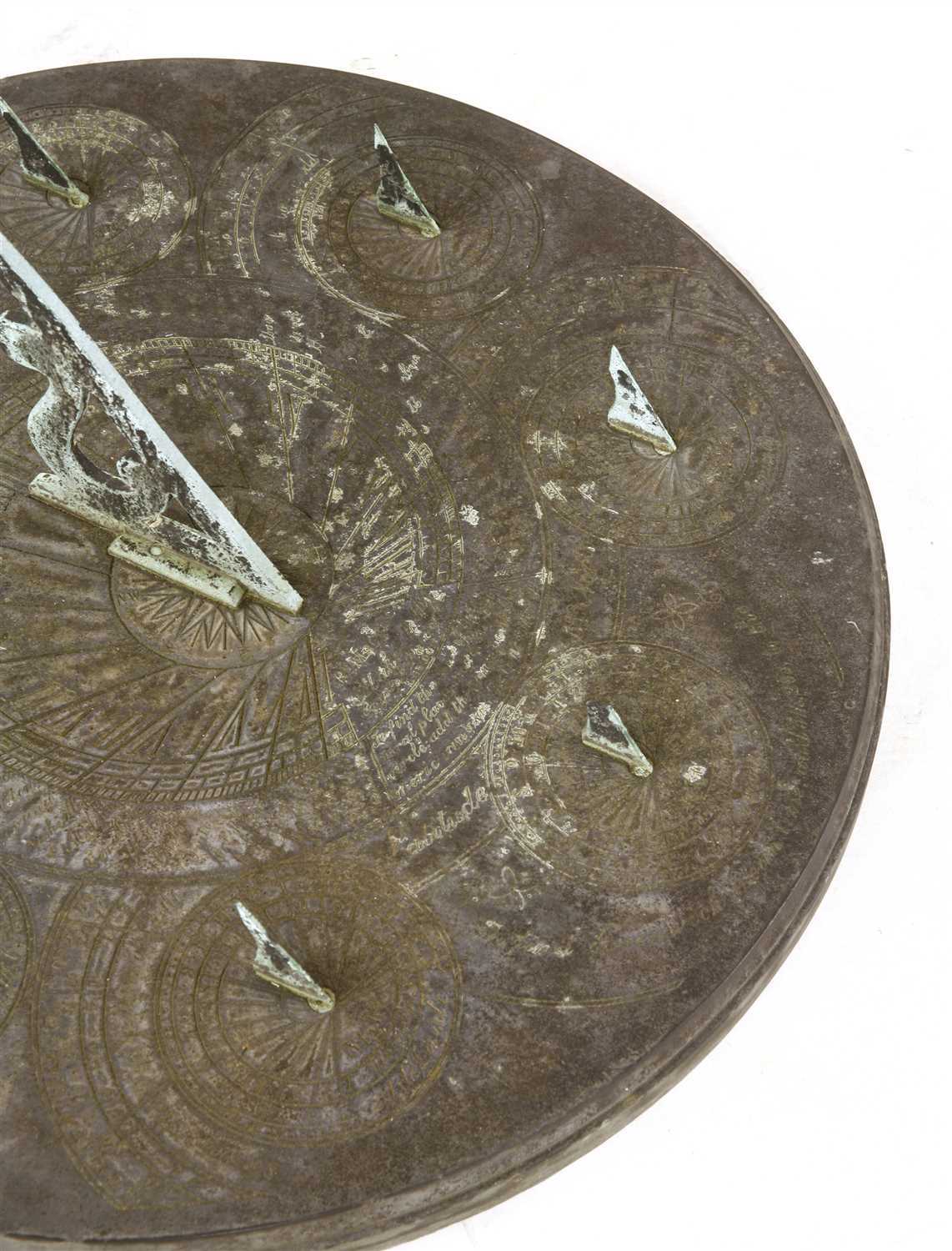 Lot 945 - A rare circular slate sundial by Richard