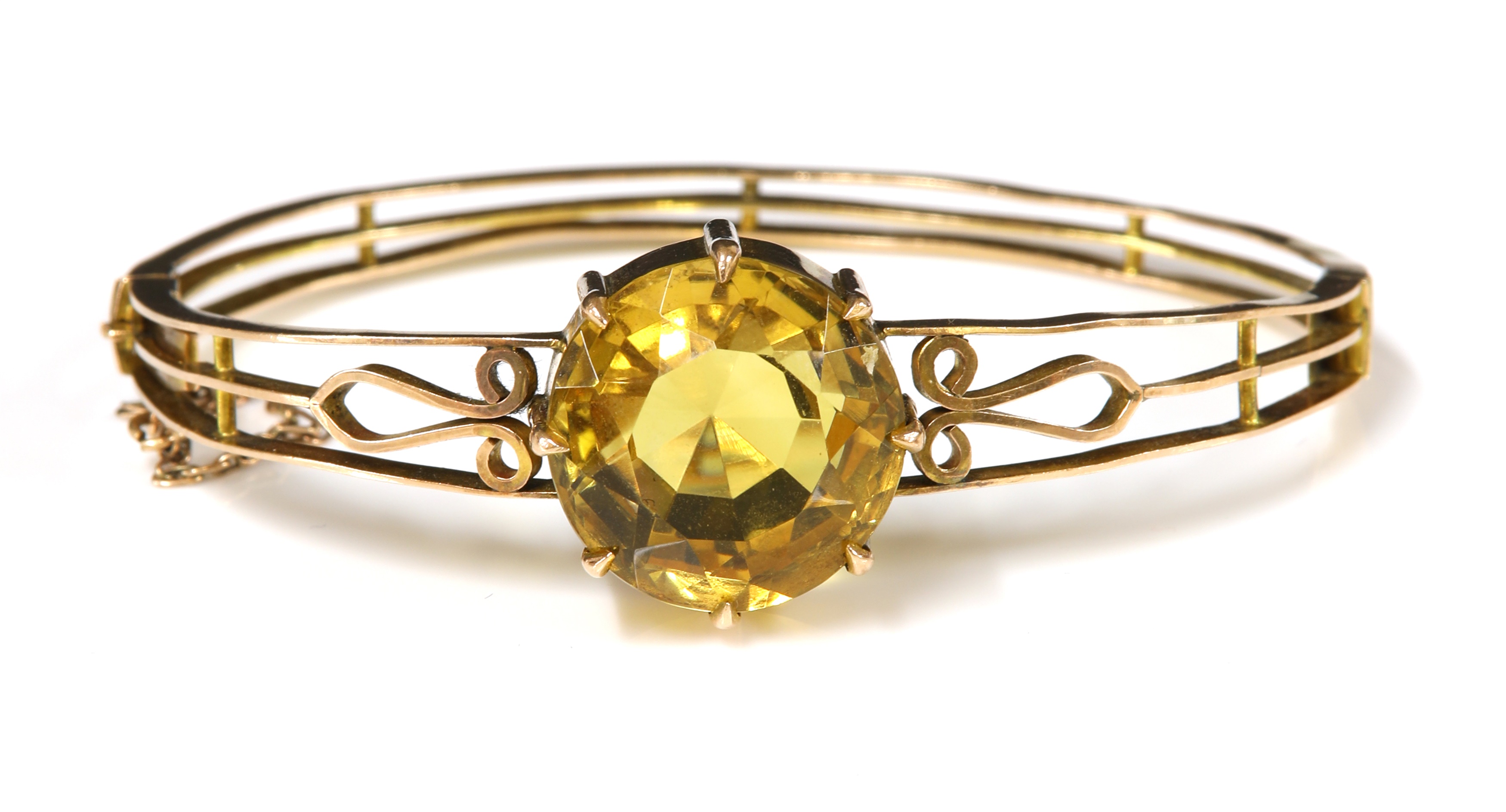 Lot 37 - A late Victorian single stone citrine bangle,