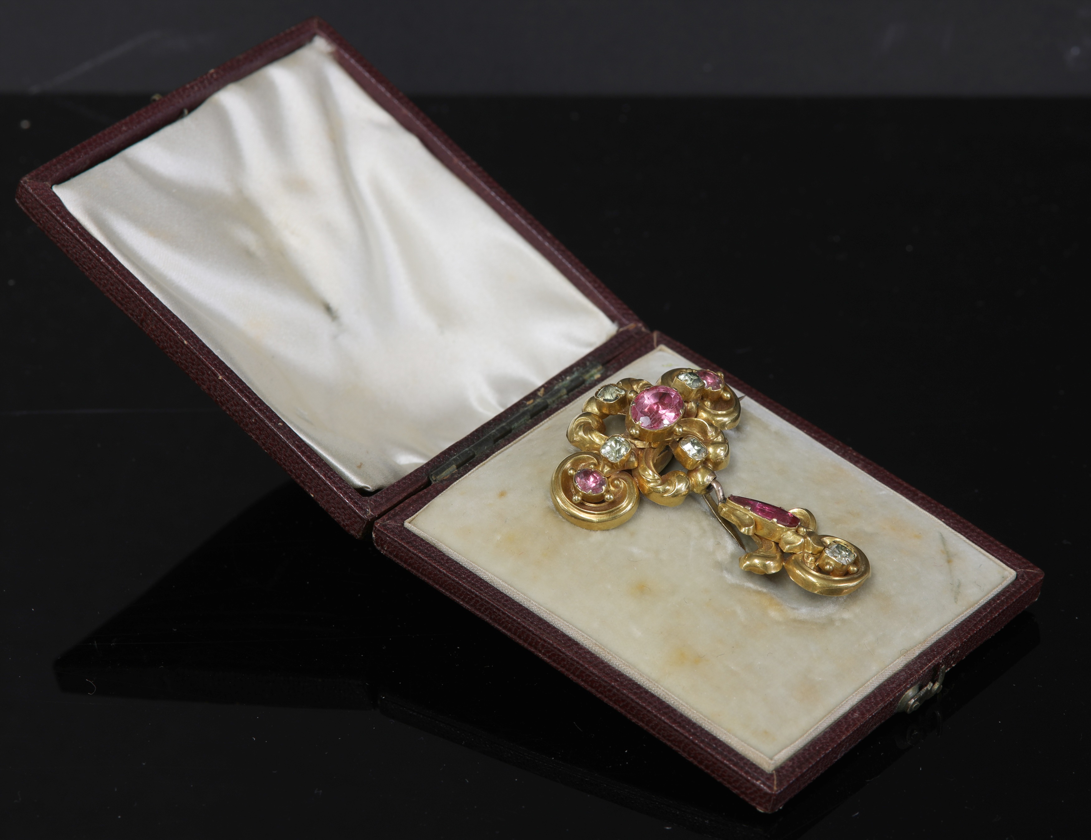 Lot 23 - A Victorian cased gold-foiled topaz and