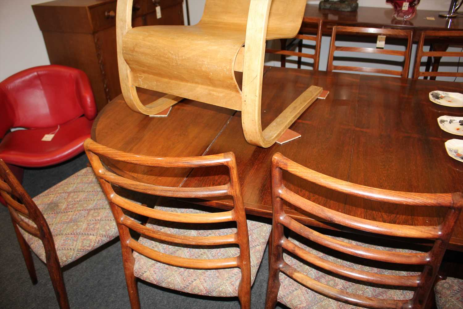 Lot 449 - A Danish rosewood dining table,