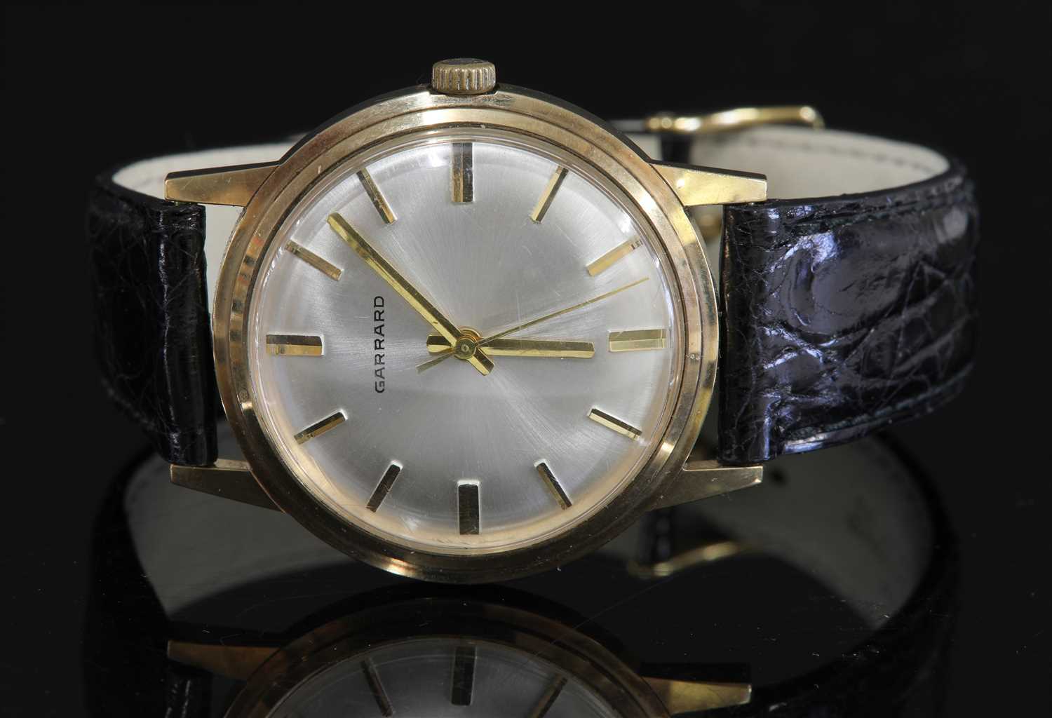 A gentlemen's 9ct gold Garrard mechanical strap watch, c.1970 ...