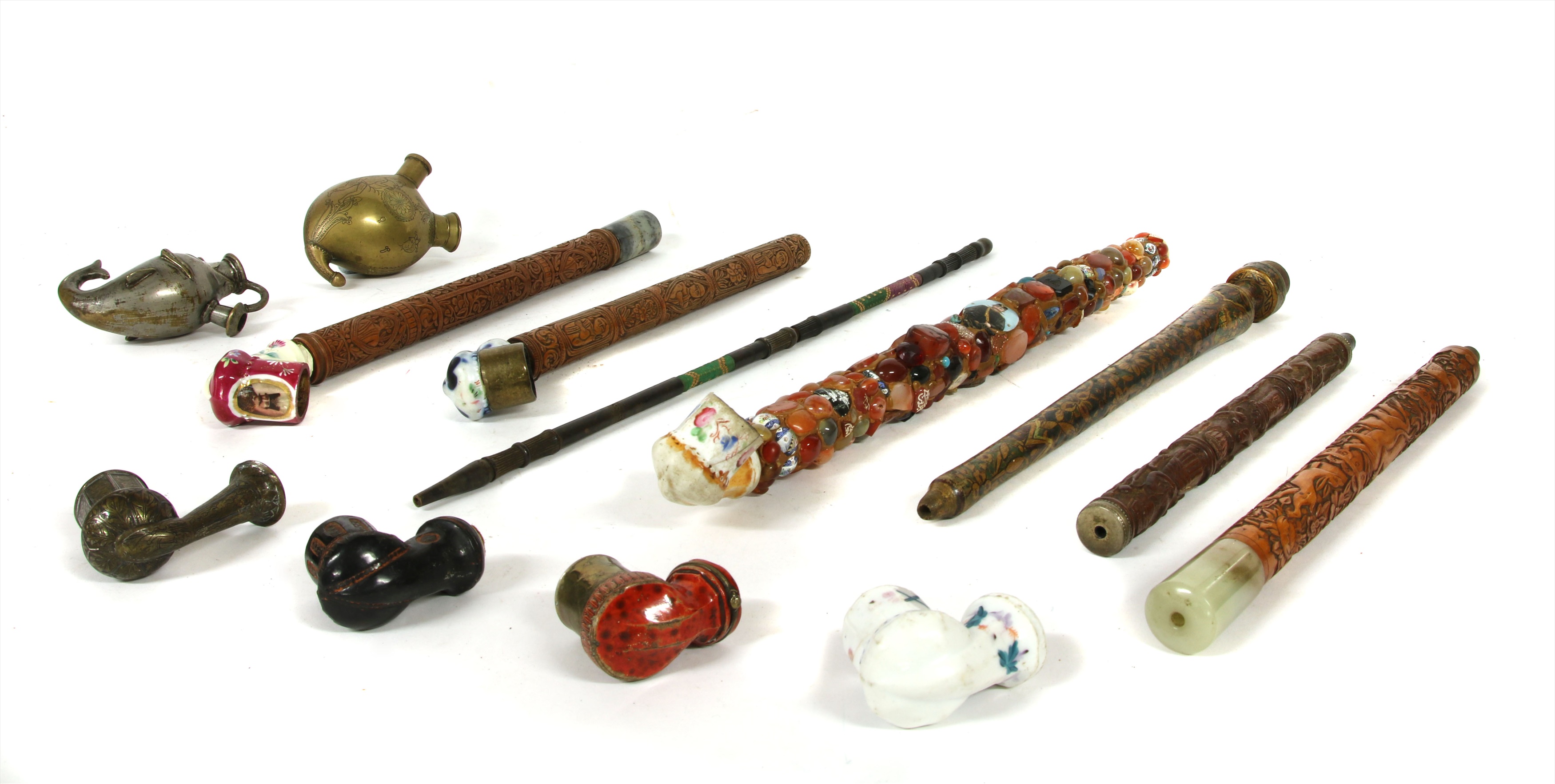 Lot 18 - Four Persian carved wood pipes,