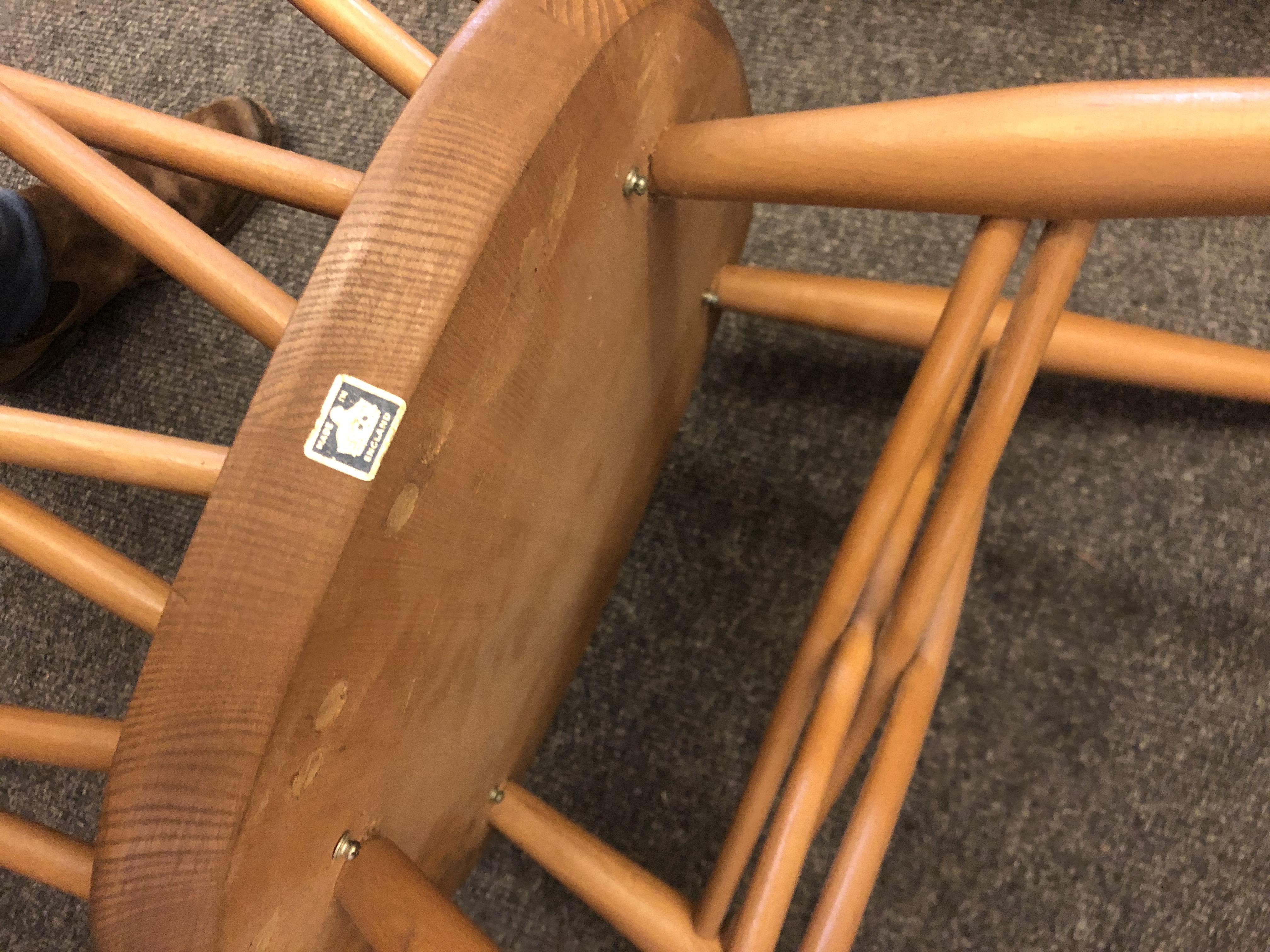 Lot 78 - An Ercol elm table,