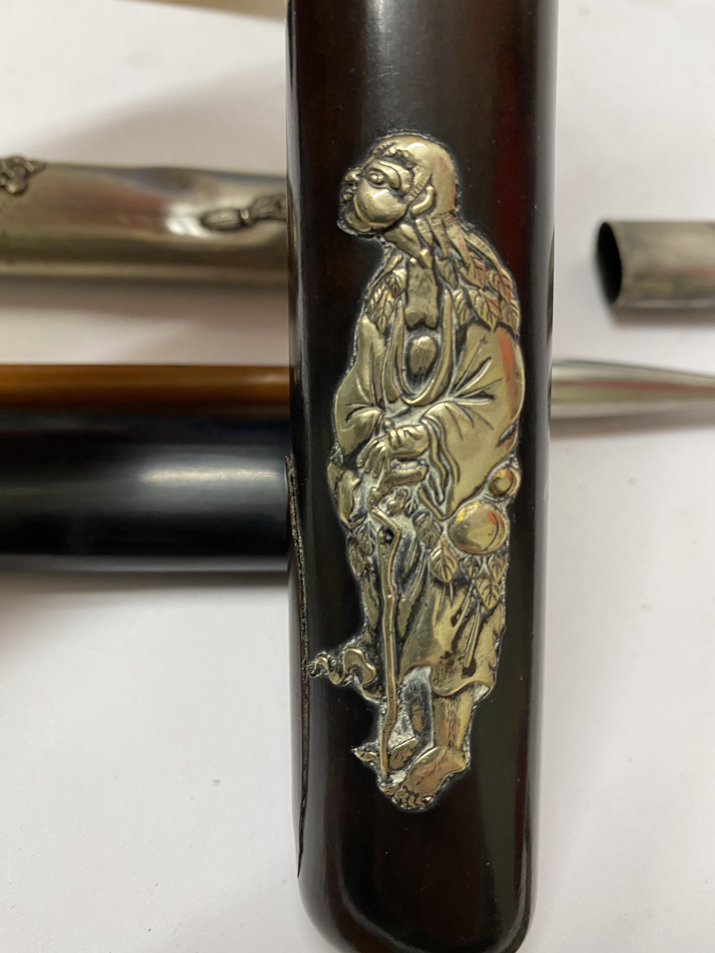 Lot 34 - Two Japanese kiseruzutsu with kiseru,