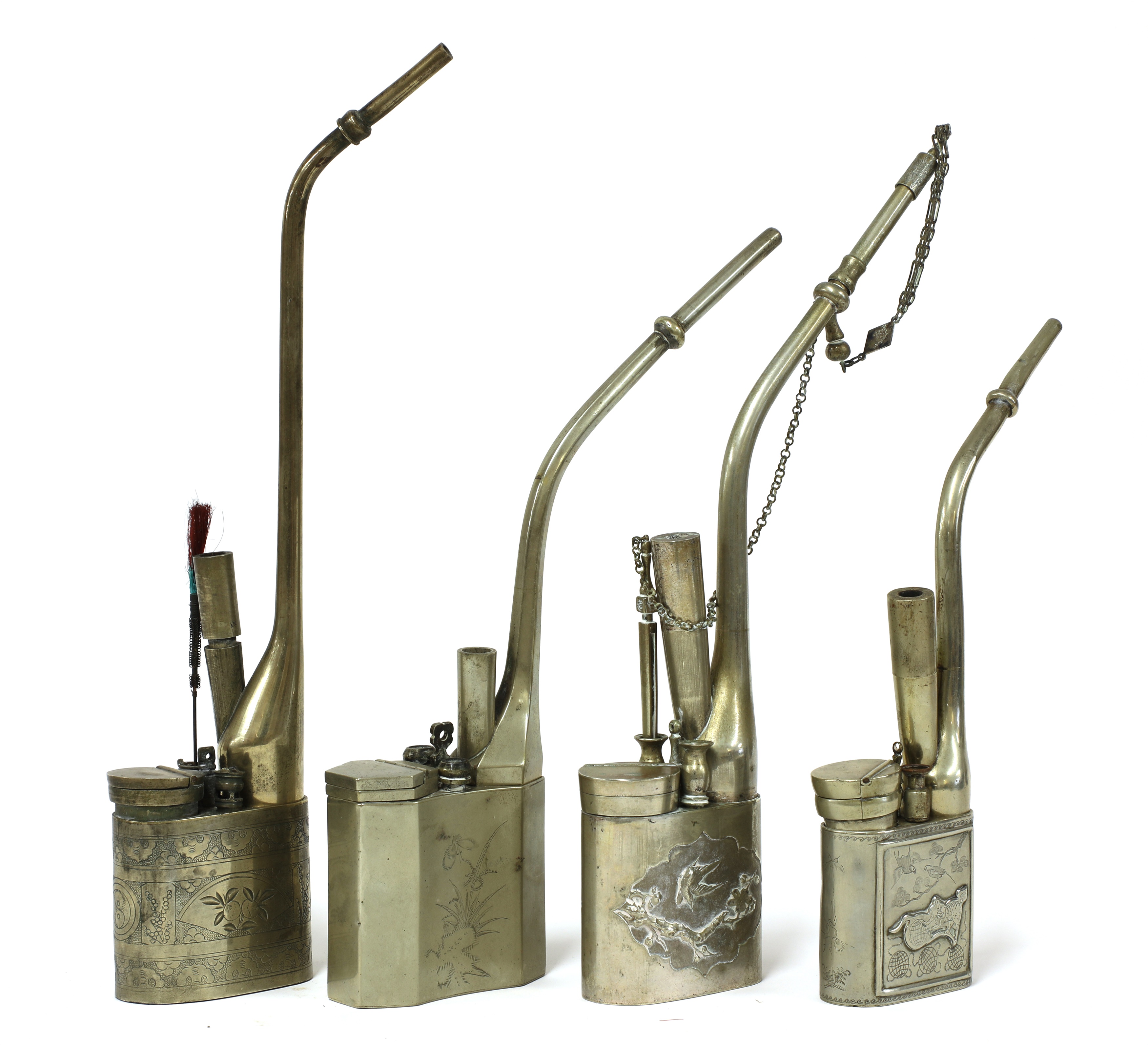 Lot 61 - A collection of four Chinese water pipes,