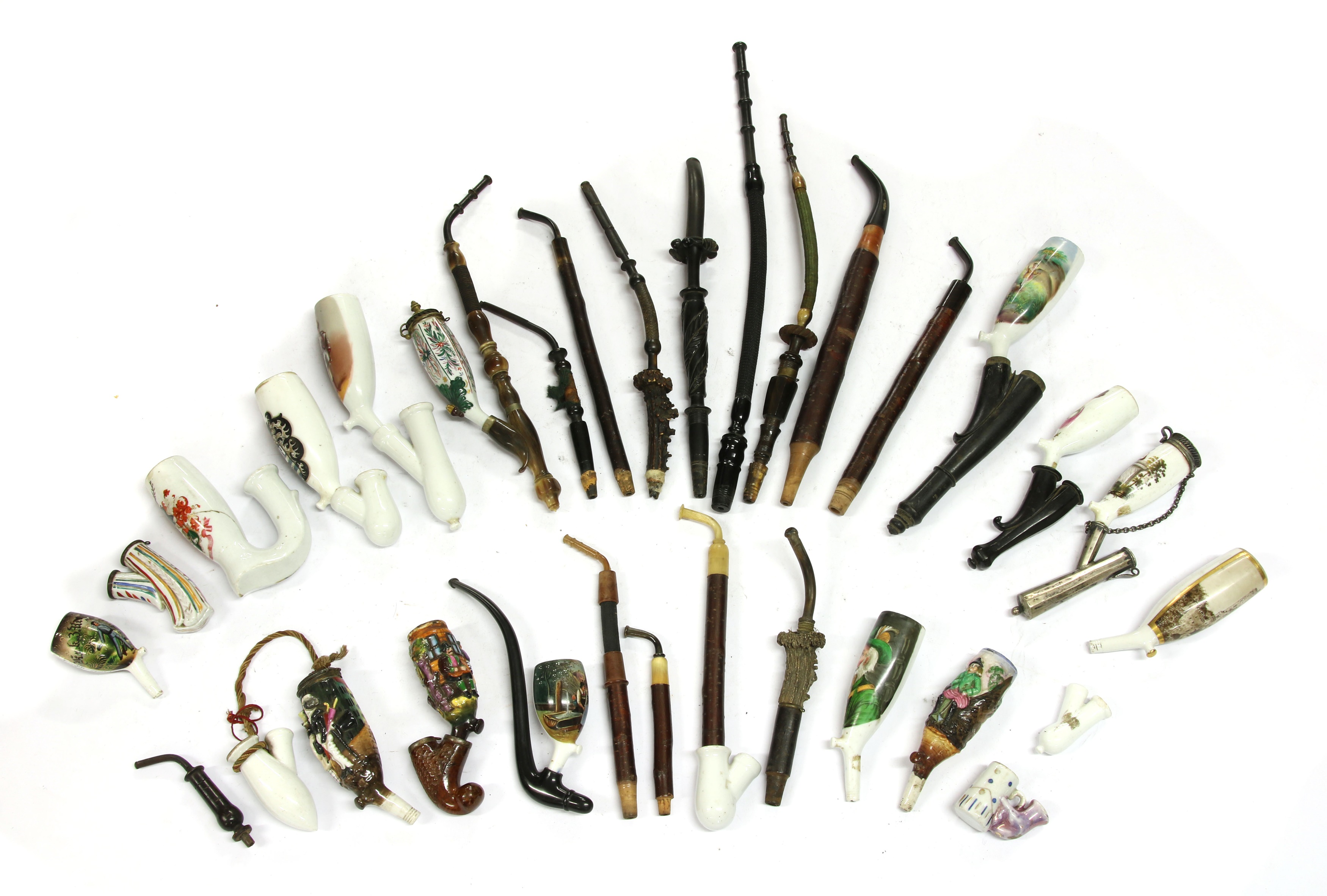 Lot 174 - Fifteen German porcelain pipes,