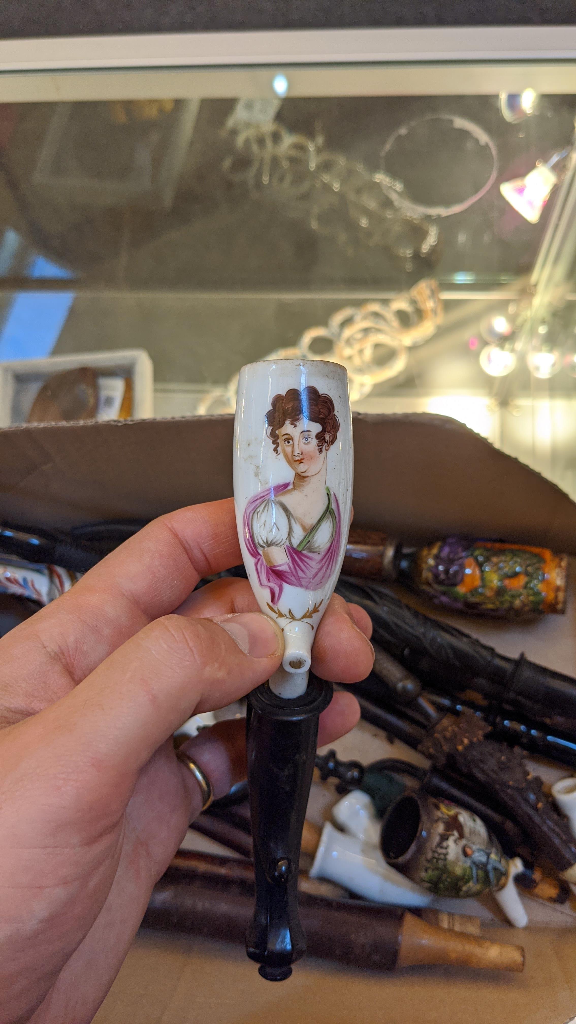 Lot 174 - Fifteen German porcelain pipes,