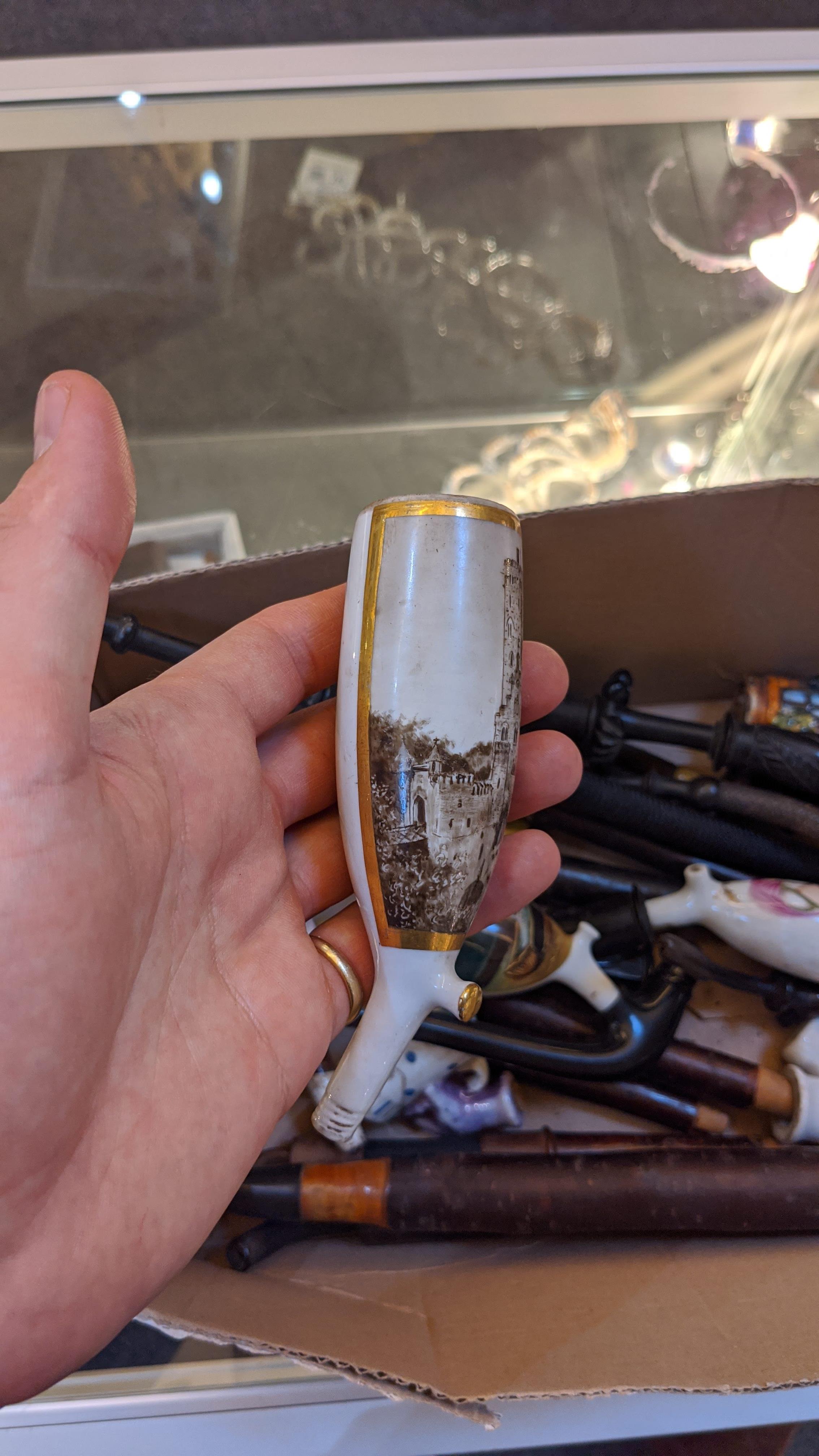 Lot 174 - Fifteen German porcelain pipes,