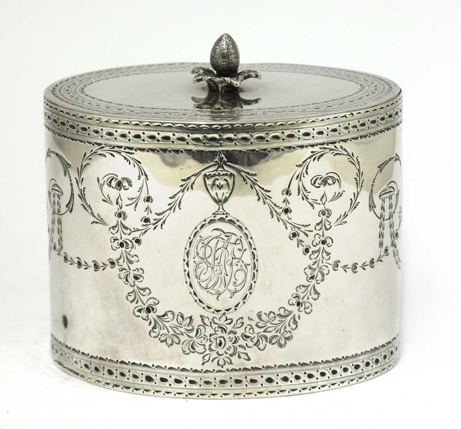Lot 6 - A George III silver oval tea caddy,