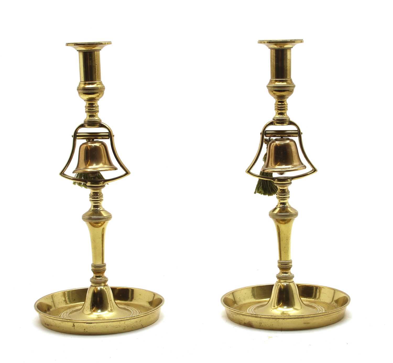Lot 387 - A pair of 18th century brass candlesticks
