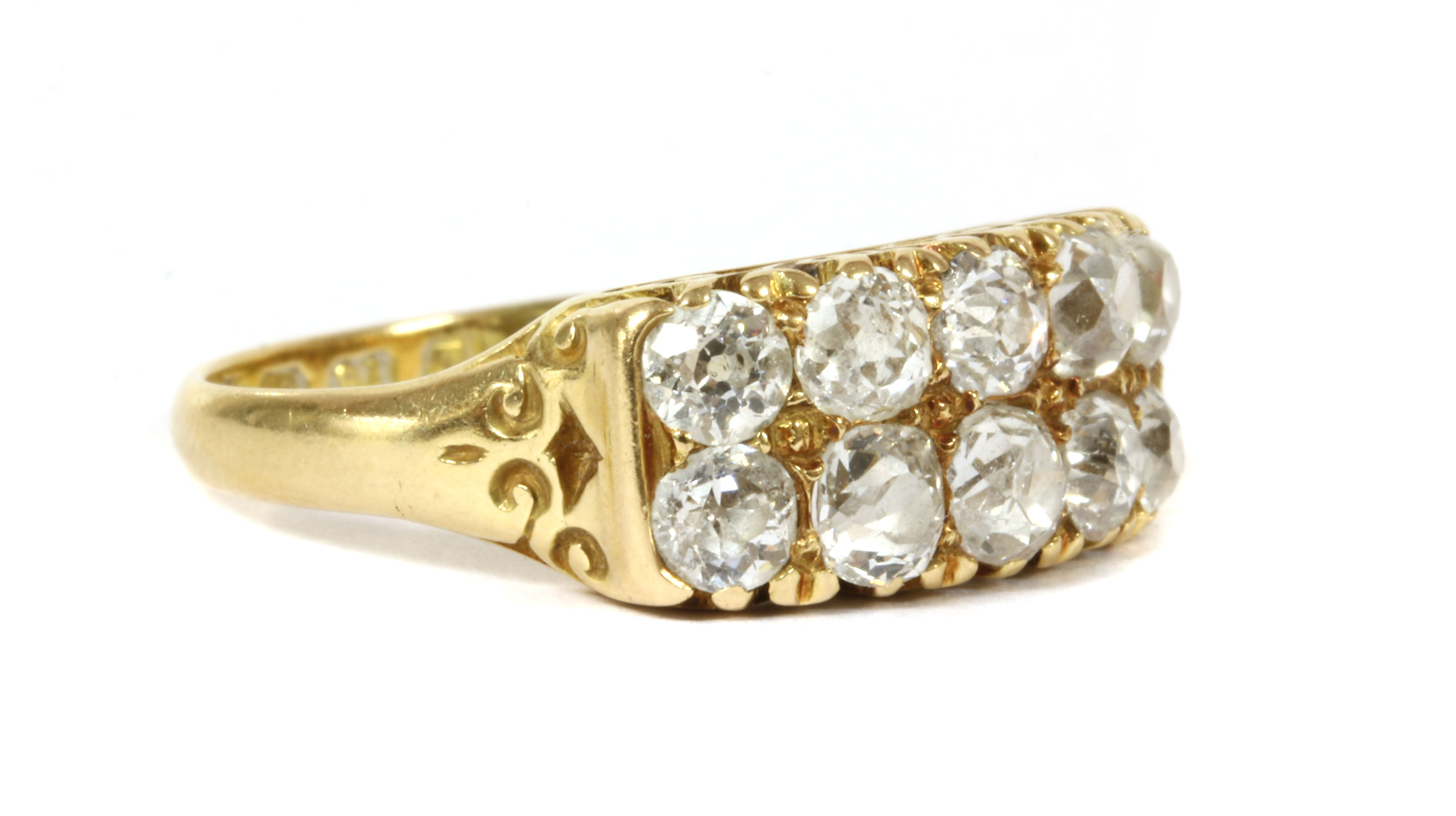 Lot 5 - A Victorian 18ct gold ten stone diamond ring,