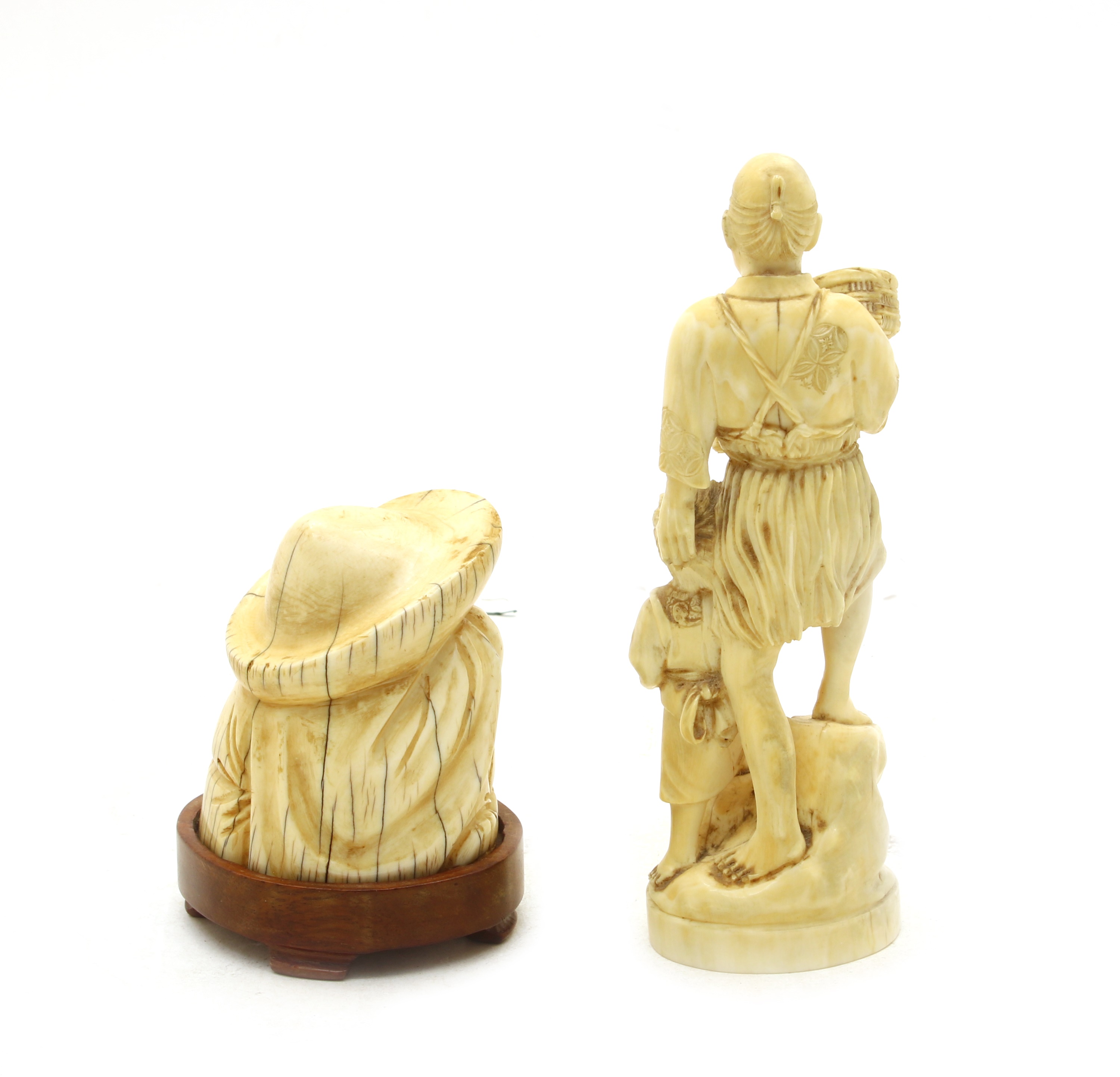 Lot 122 - A Japanese ivory okimono,