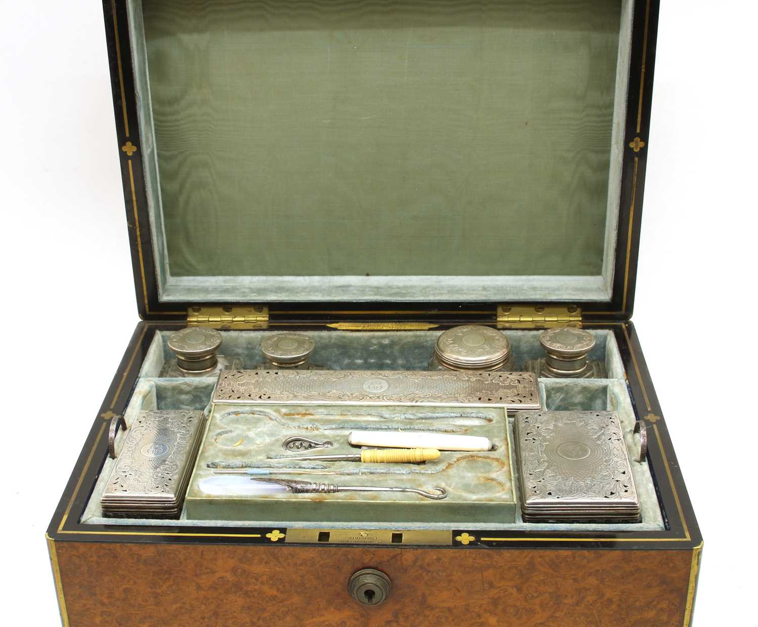 Lot 150 - An early Victorian burr maple fitted vanity