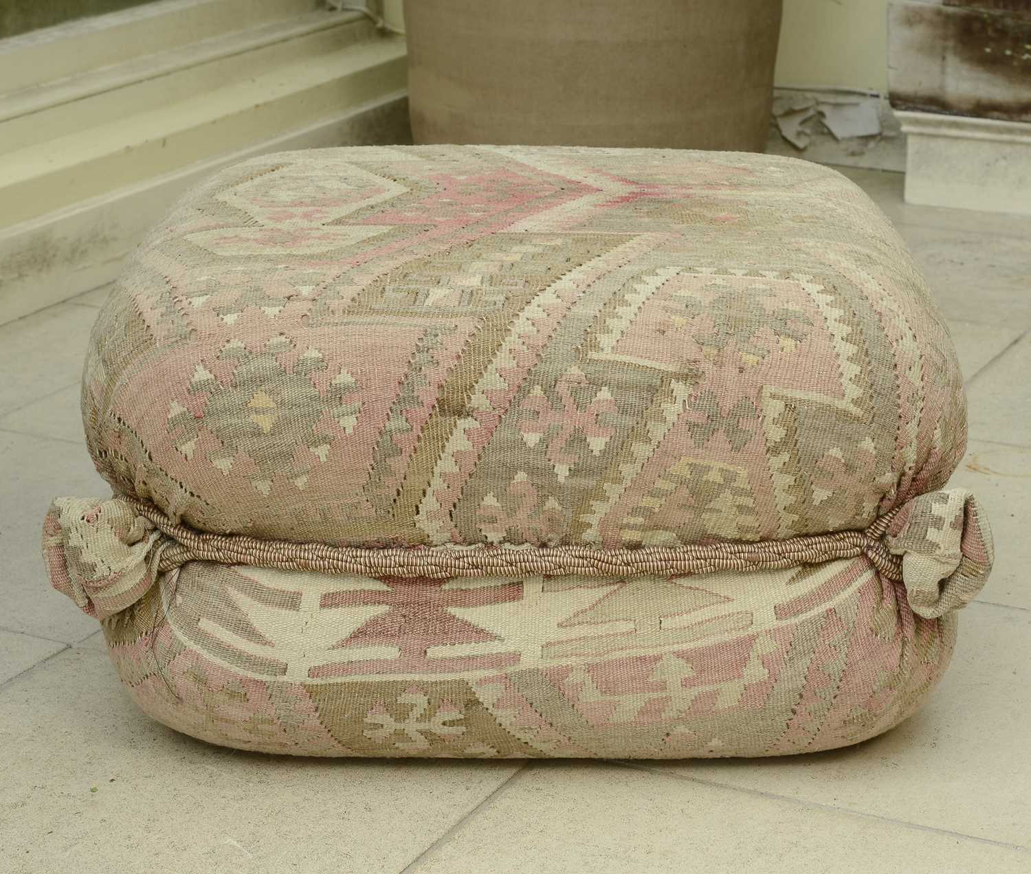 Lot 4 - A kelim-covered pouffe,