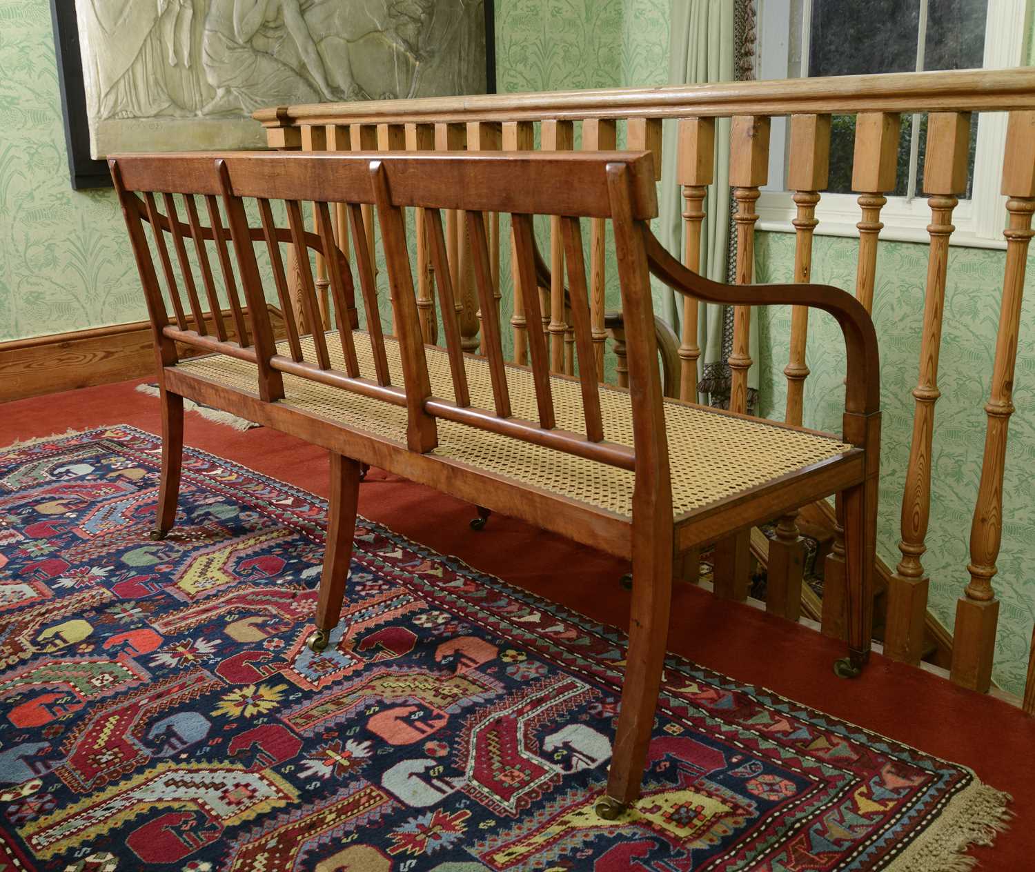 Lot 52 - A Regency-style satinwood settee,