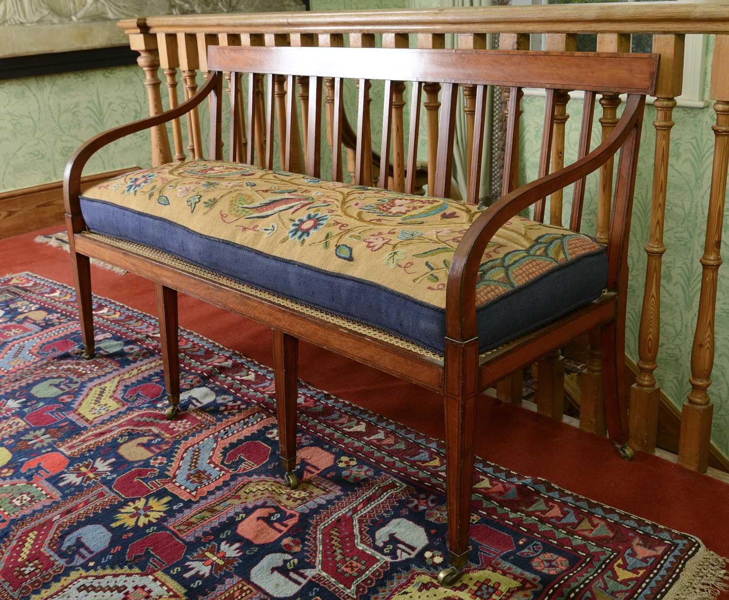 Lot 52 - A Regency-style satinwood settee,