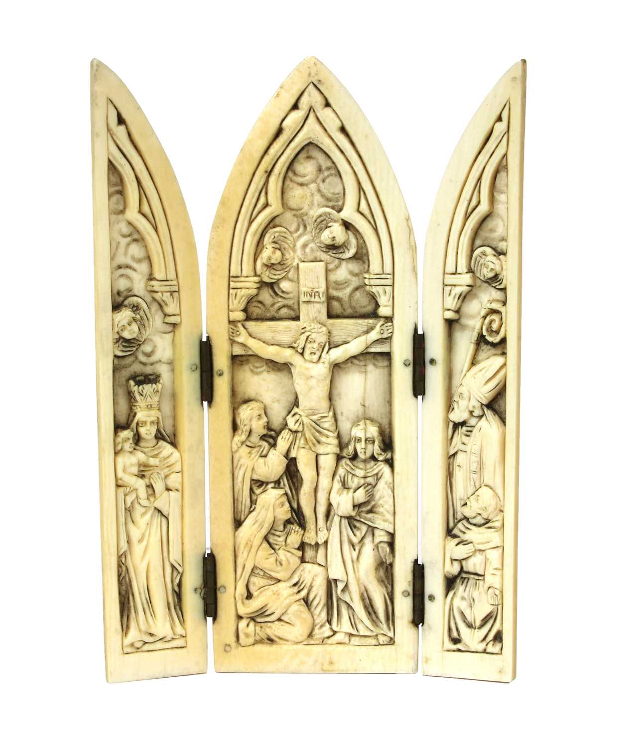 Lot 381 - A carved ivory triptych,