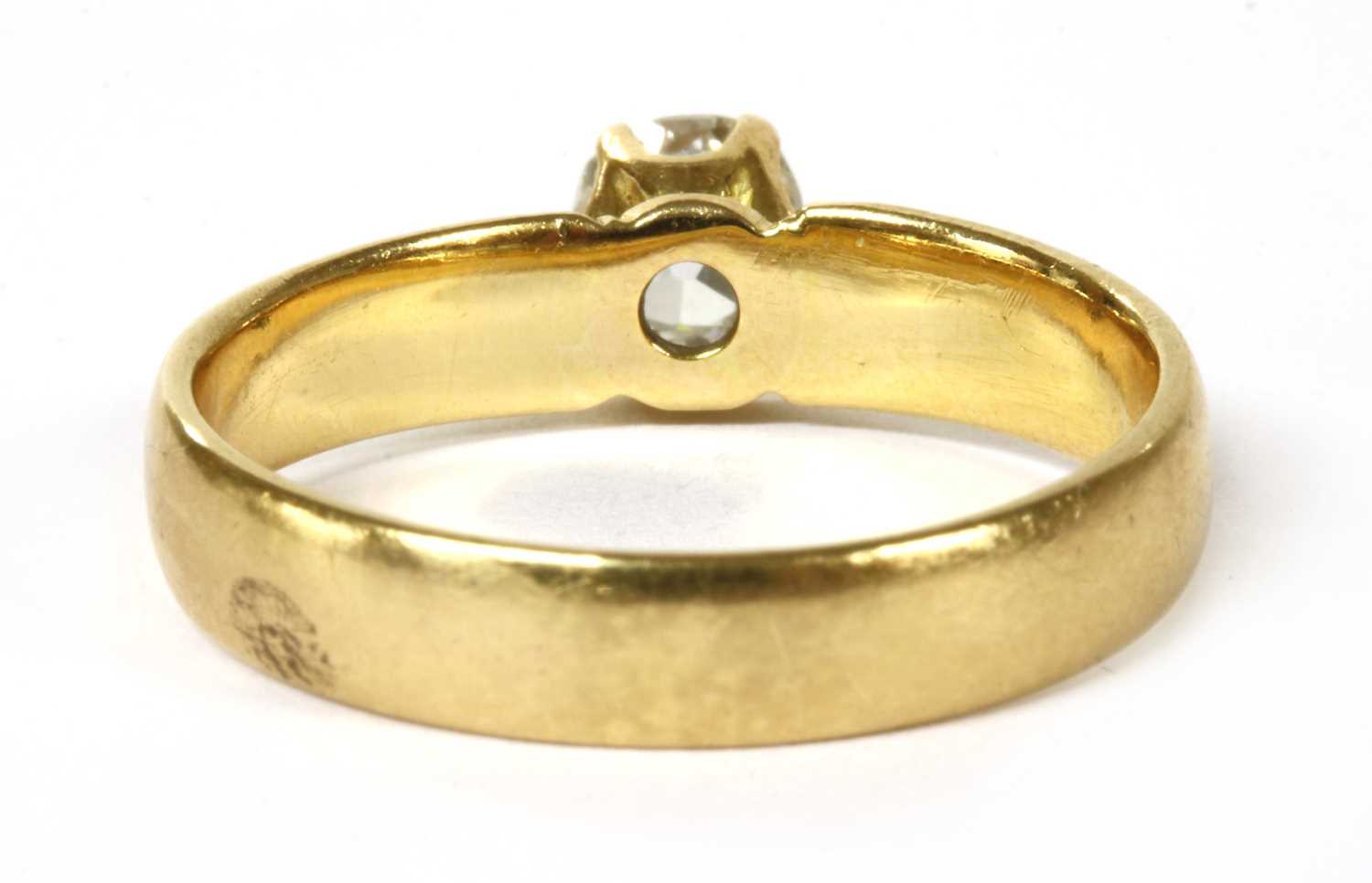 Lot 8 - A gold single stone diamond ring,