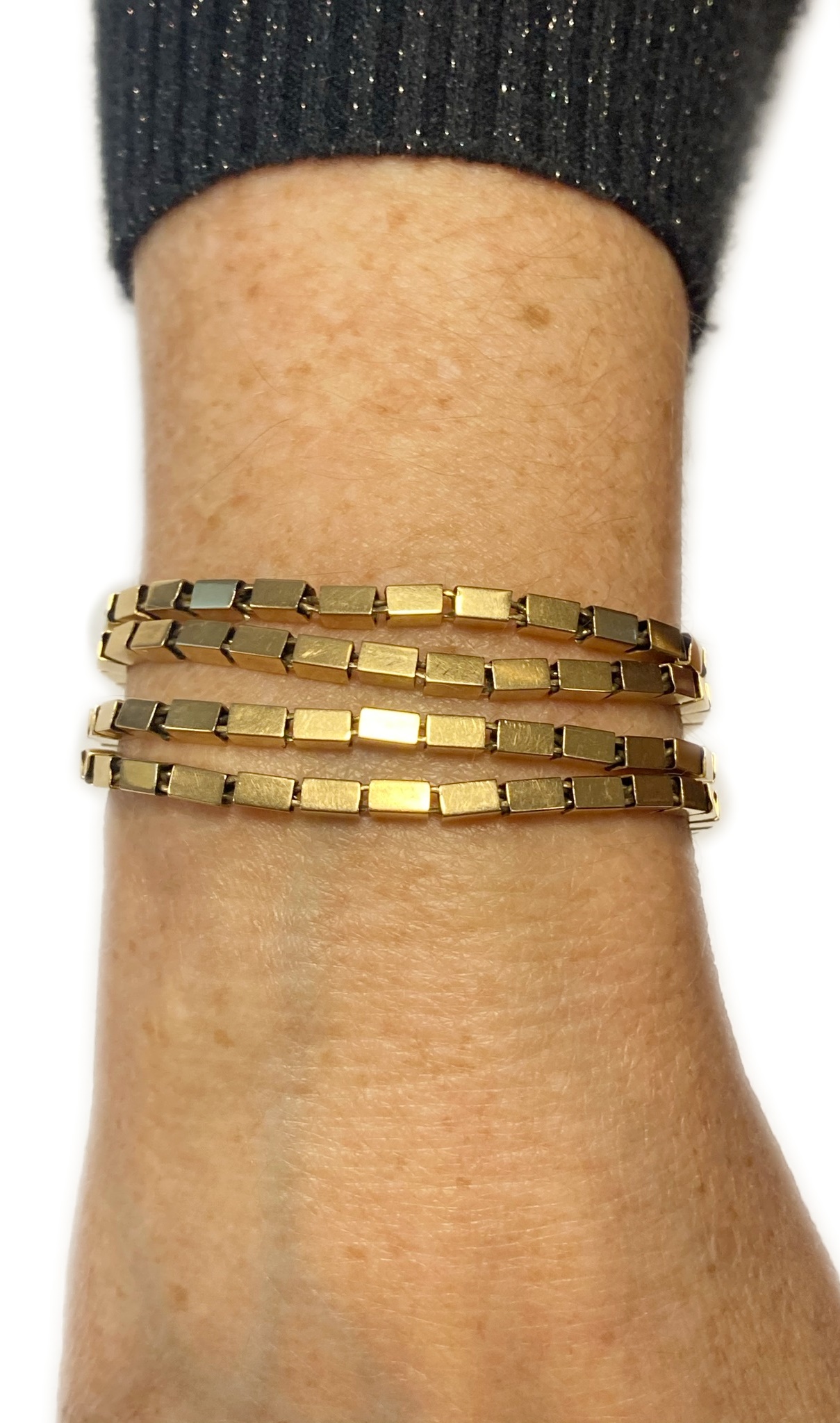 Lot 182 - An Italian 18ct gold four row bracelet,