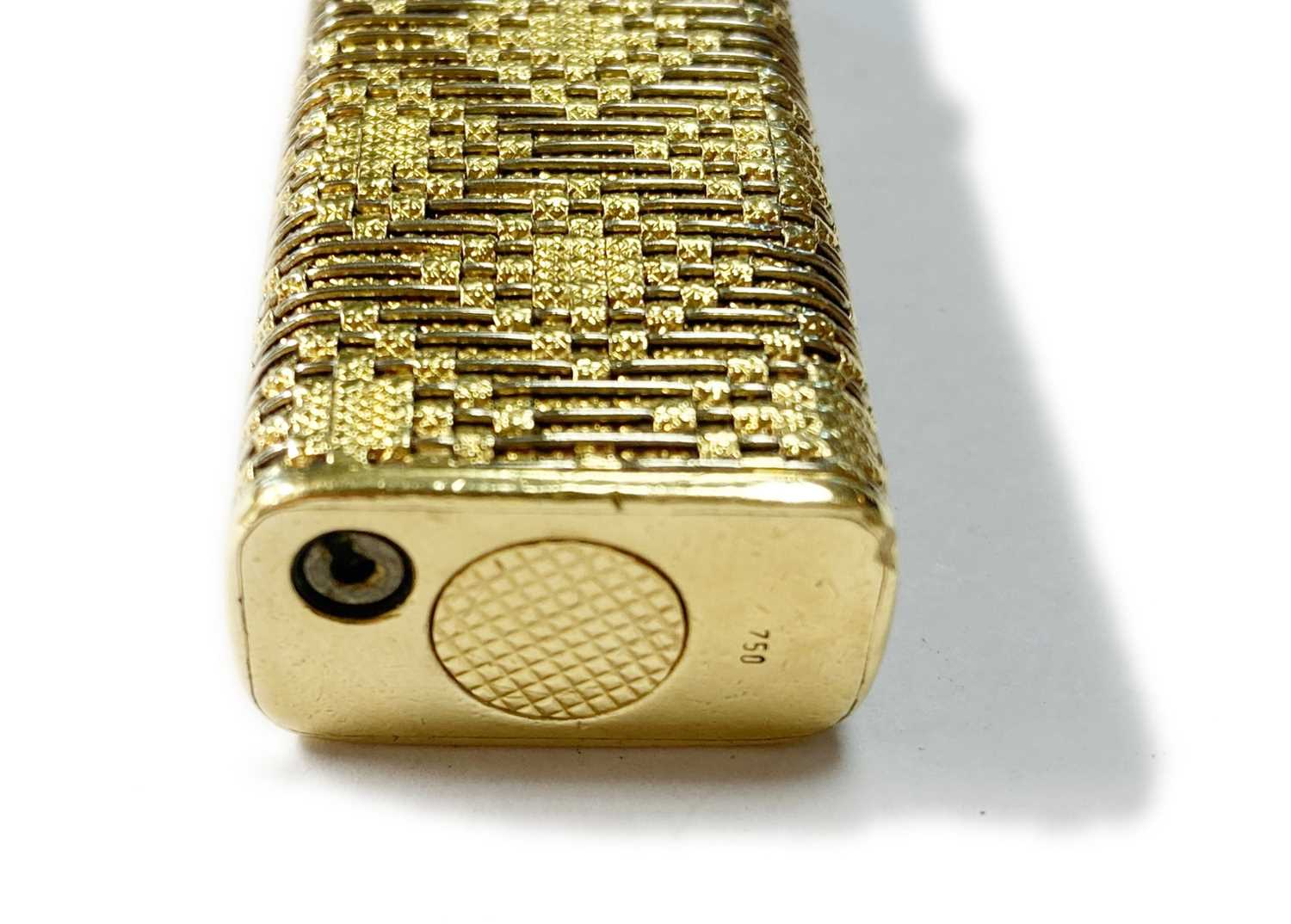 Lot 333 - A gold Dunhill lighter,