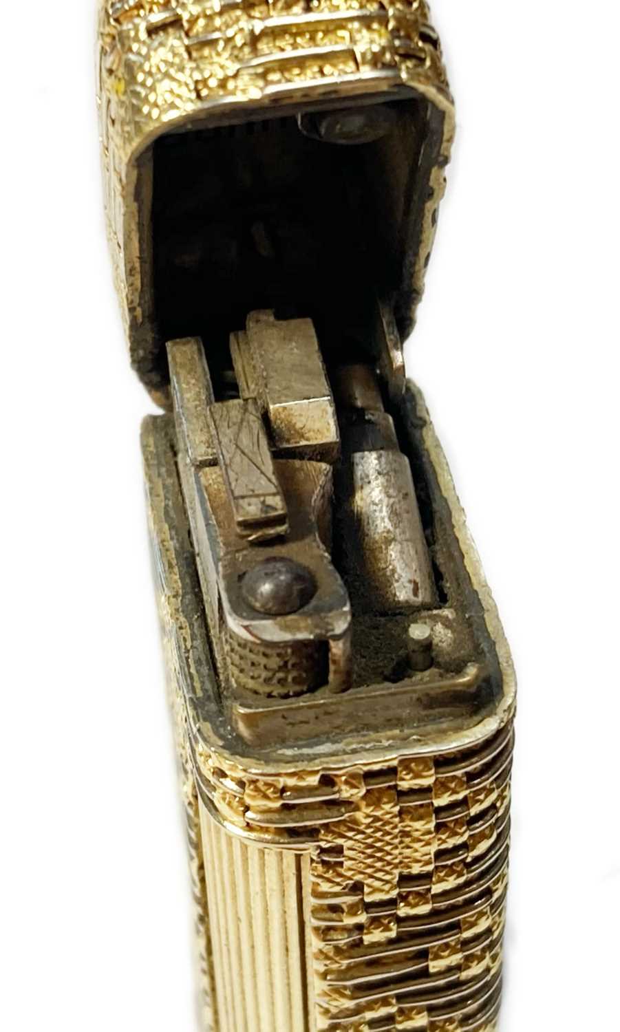 Lot 333 - A gold Dunhill lighter,