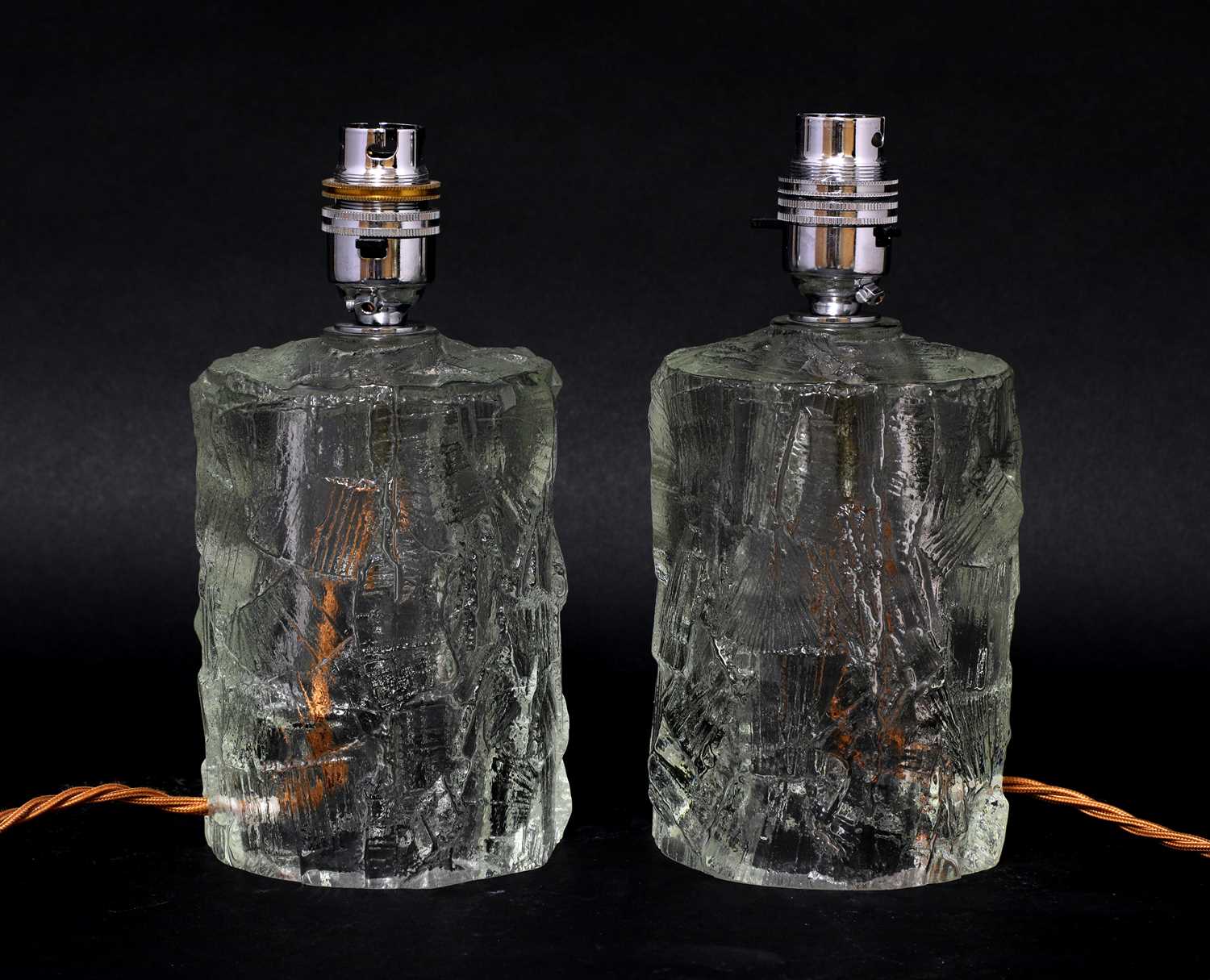 Lot 433 - A pair of heavy glass table lamp bases,