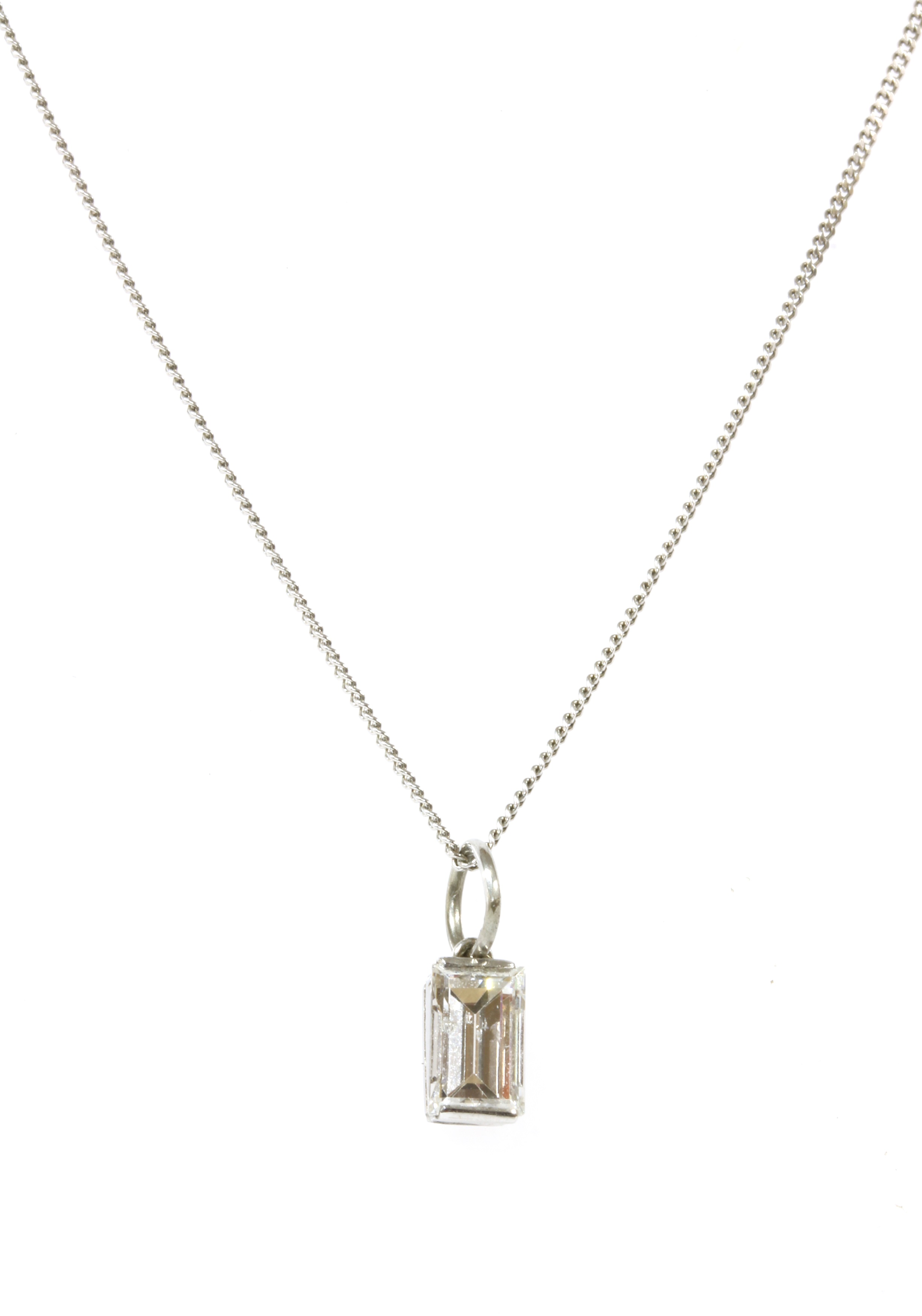 Lot 92 - A white gold single stone diamond pendant,