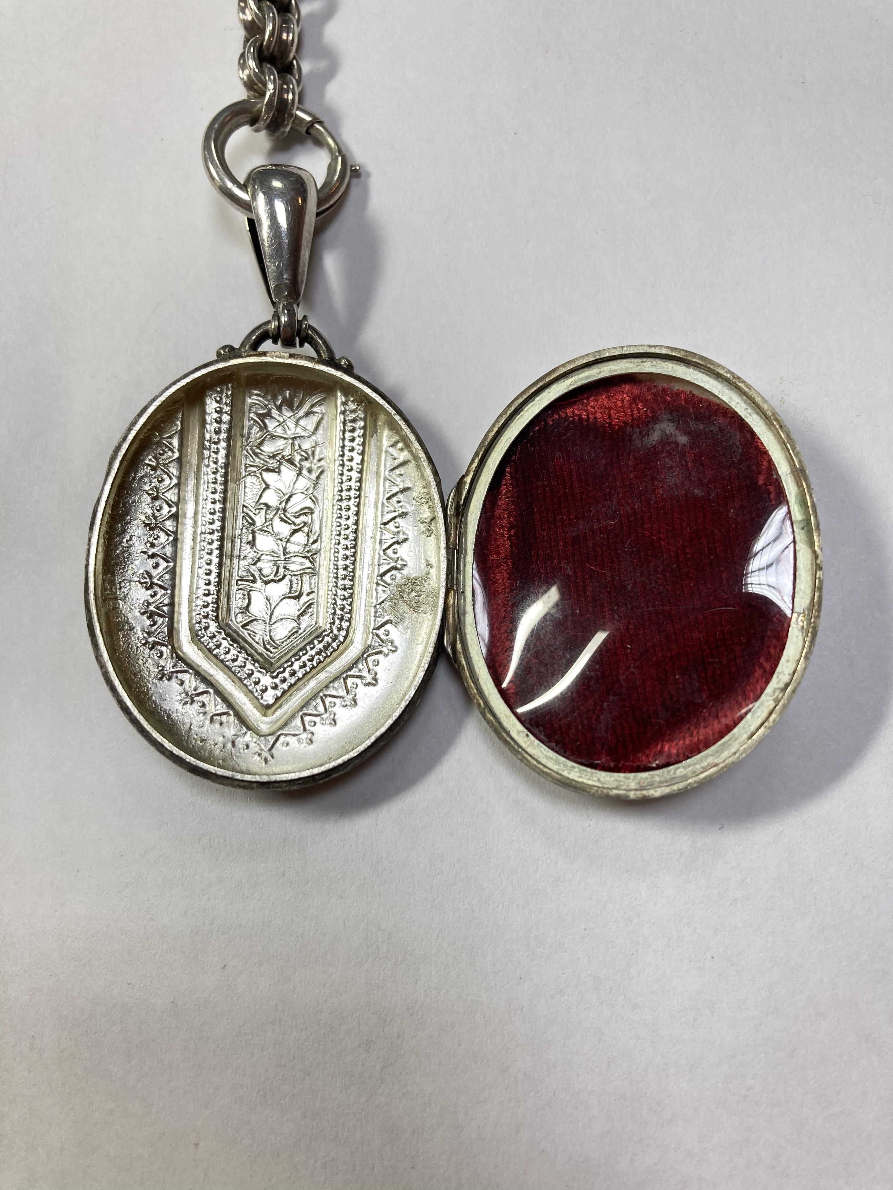Lot 47 - A Victorian sterling silver locket and collar,