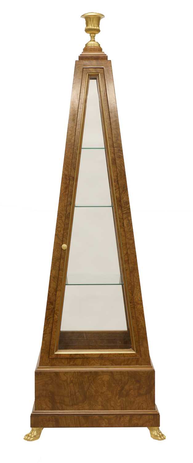 Lot 587 - A contemporary obelisk display cabinet,
