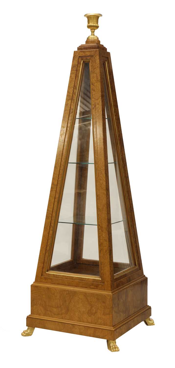 Lot 587 - A contemporary obelisk display cabinet,