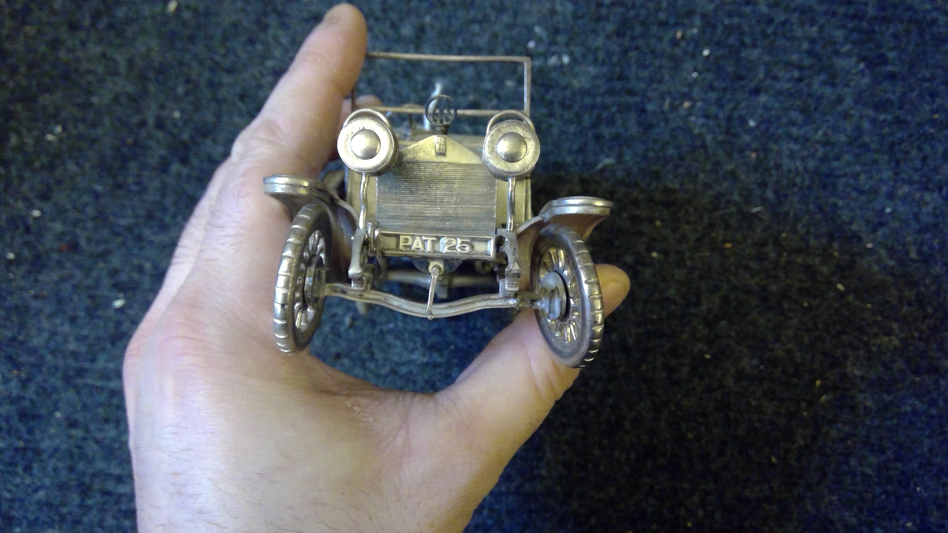 Lot 10 - A silver scale model of a Rolls Royce,