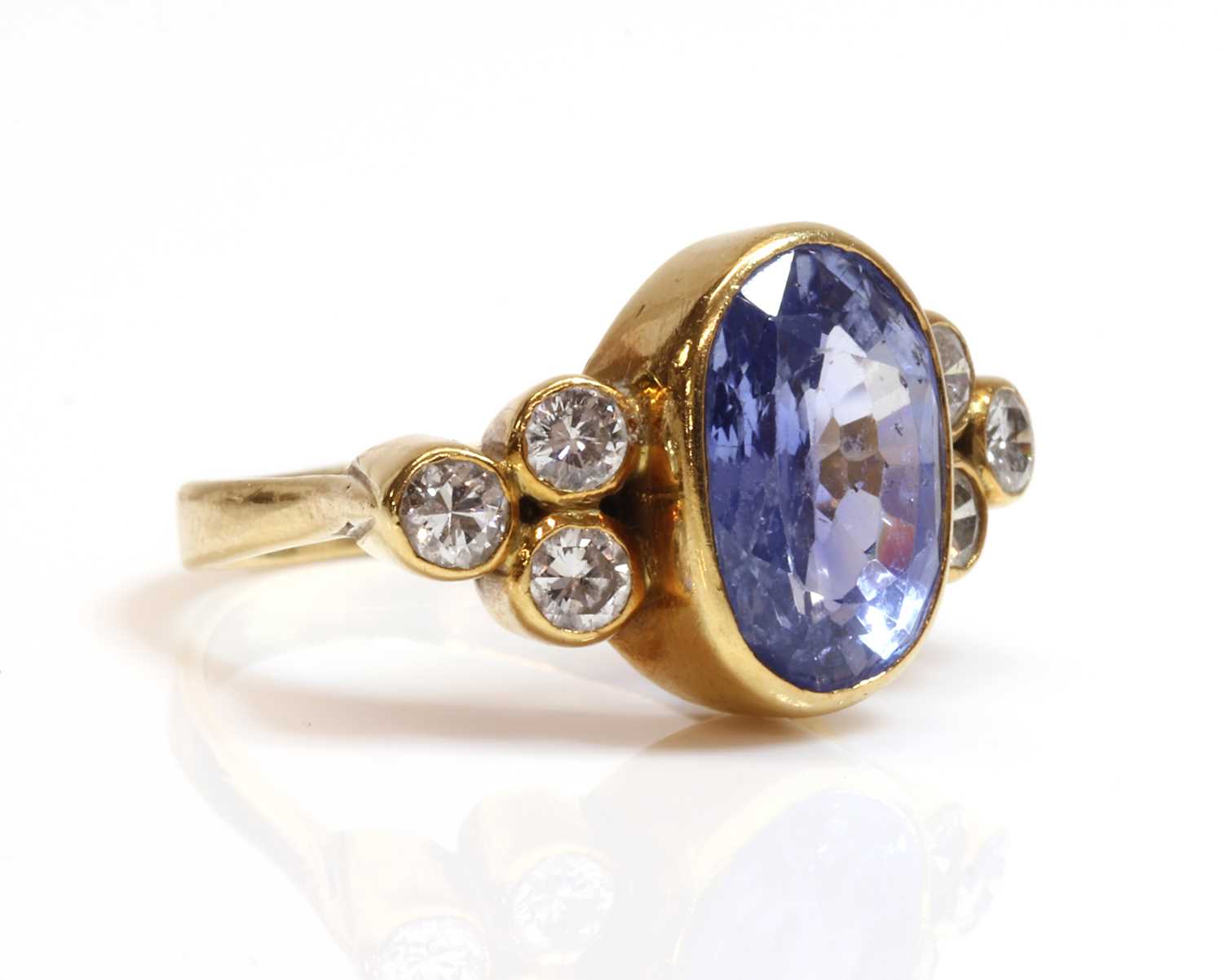 Lot 297 - An 18ct gold single stone sapphire ring,