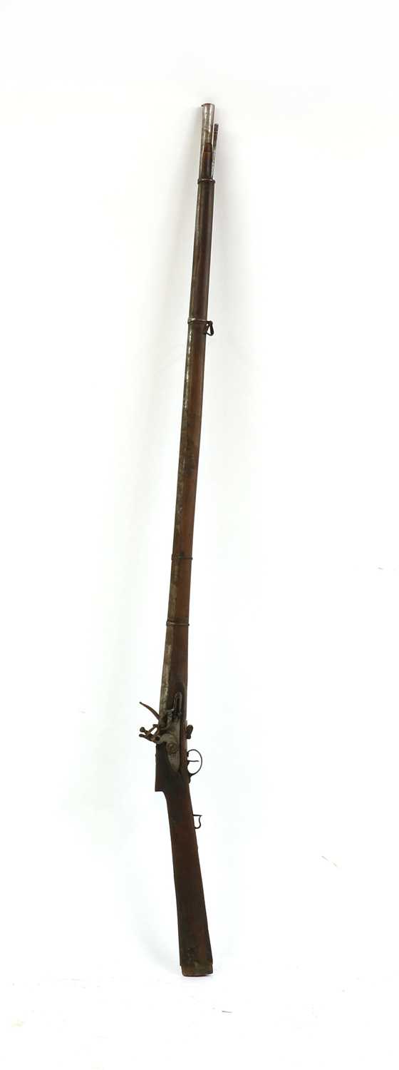 Lot 223 - An Afghanistan teak and iron shooting rifle,