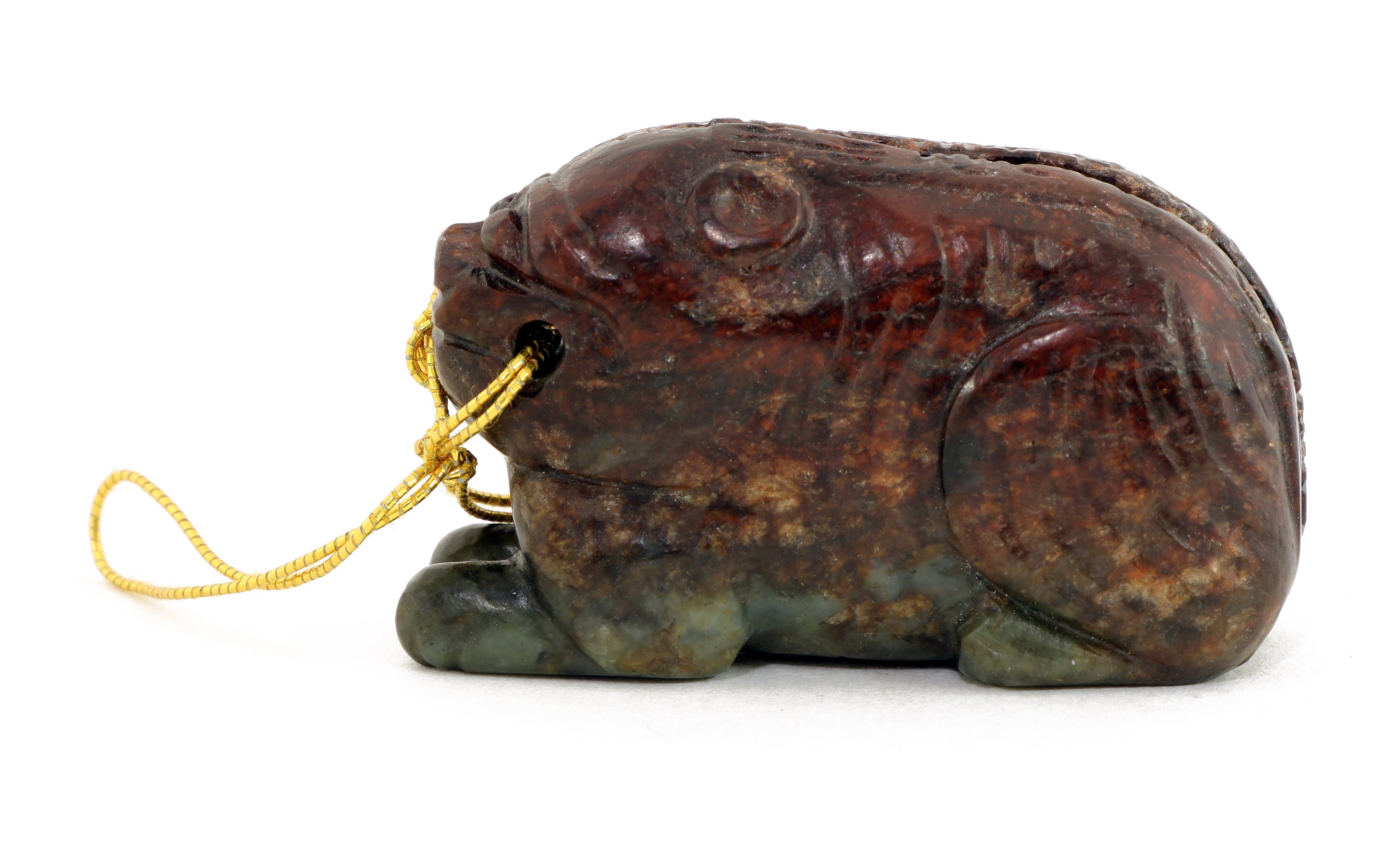 Lot 106 - A Chinese inscribed jade 'tiger' tally,
